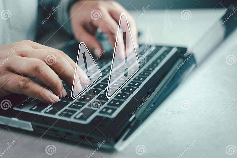 Businessman or Programmer Using Laptop with Triangle Caution Warning ...