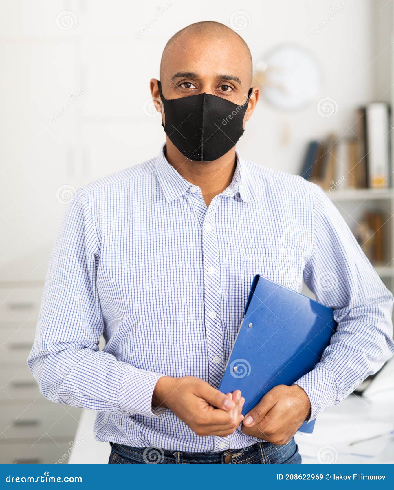 Businessman in Protective Mask Makes Notes in Document Stock Image ...