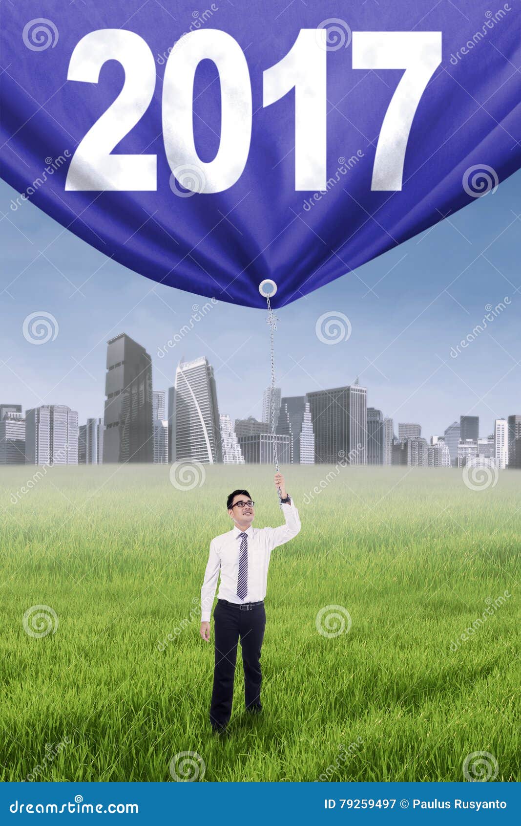 Businessman Pull Numbers 2017 at Field Stock Image - Image of blue ...