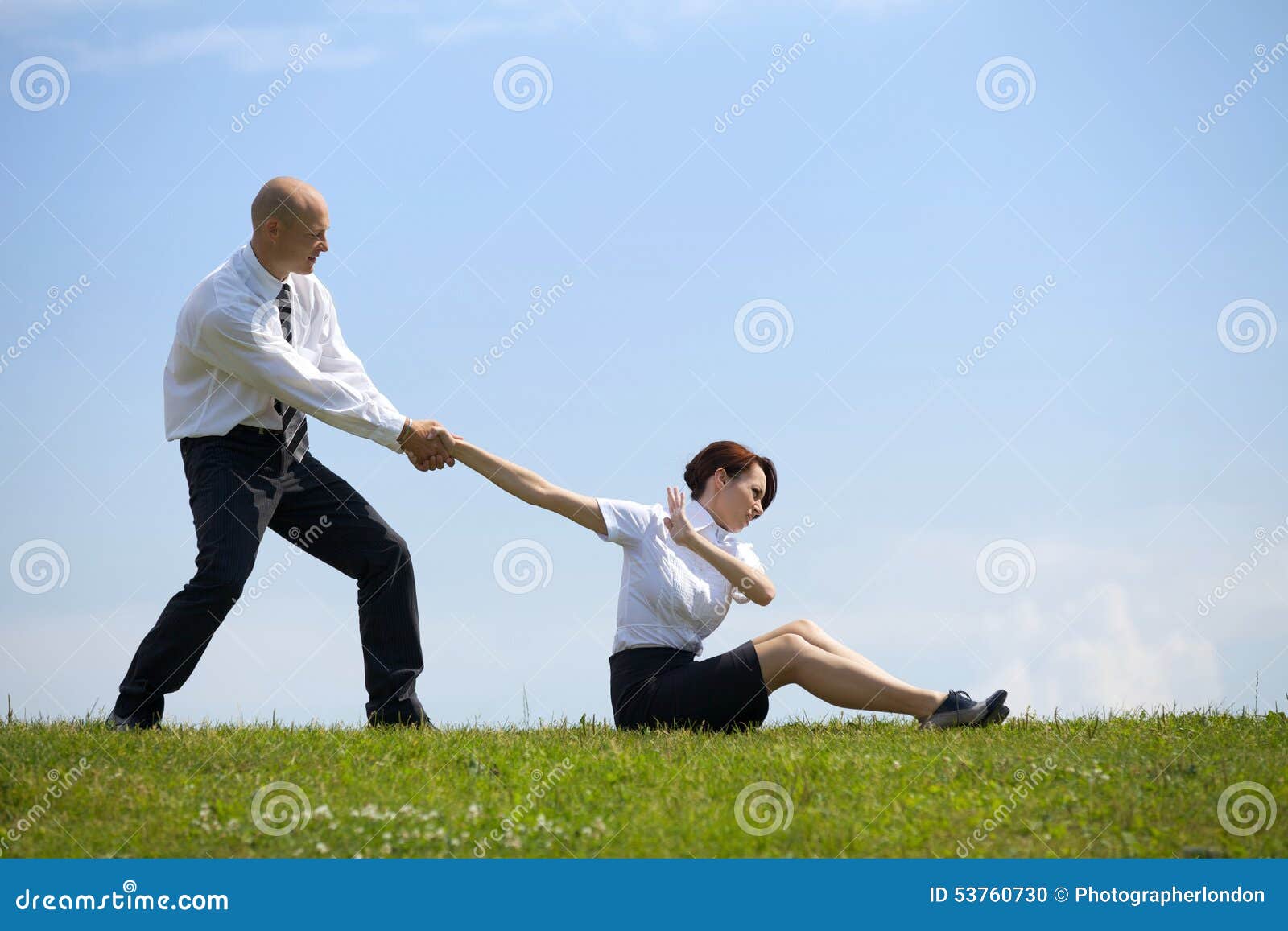 Businessman Pulling Businesswoman S Hand in Park Stock Photo - Image of ...