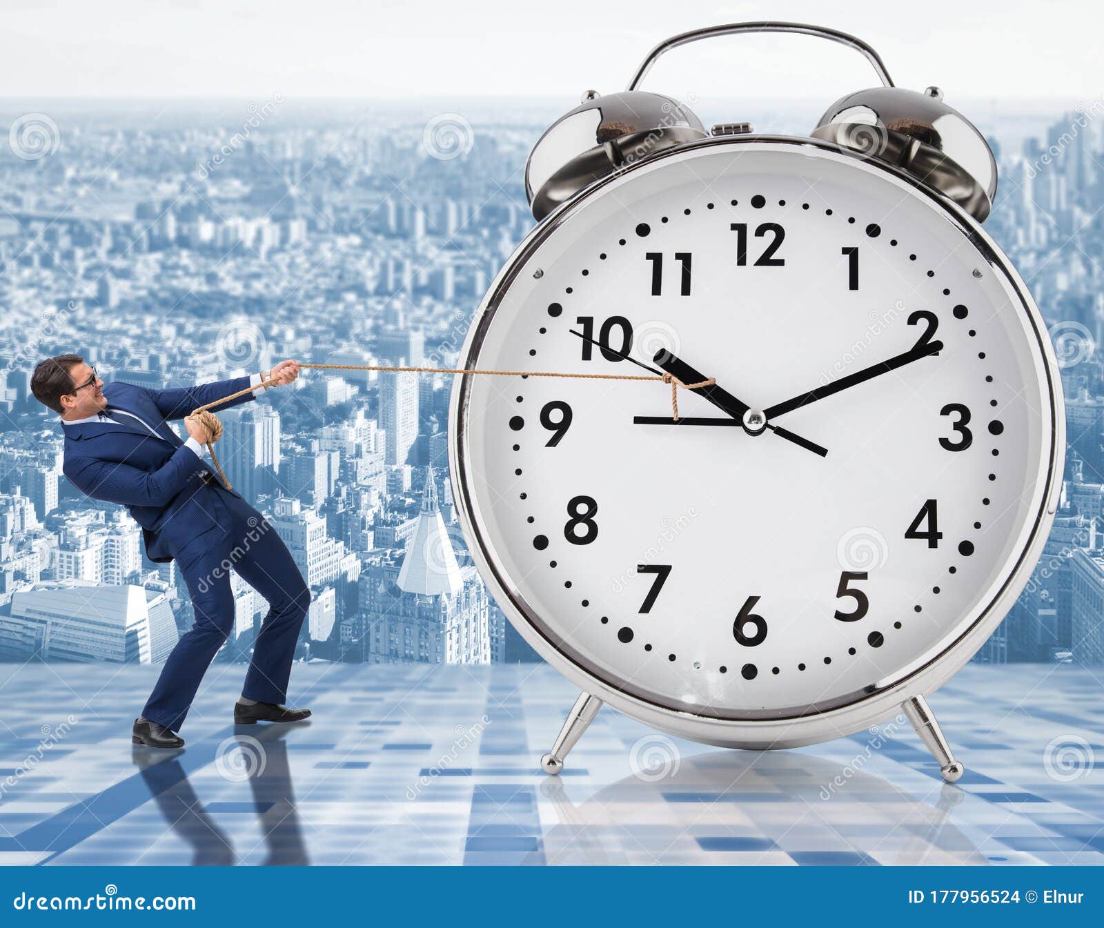 Businessman Pulling Clock in Time Management Concept Stock Photo ...