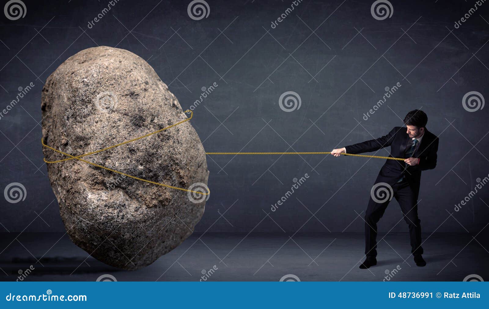 Businessman Pulling Huge Rock with a Rope Stock Image - Image of people ...