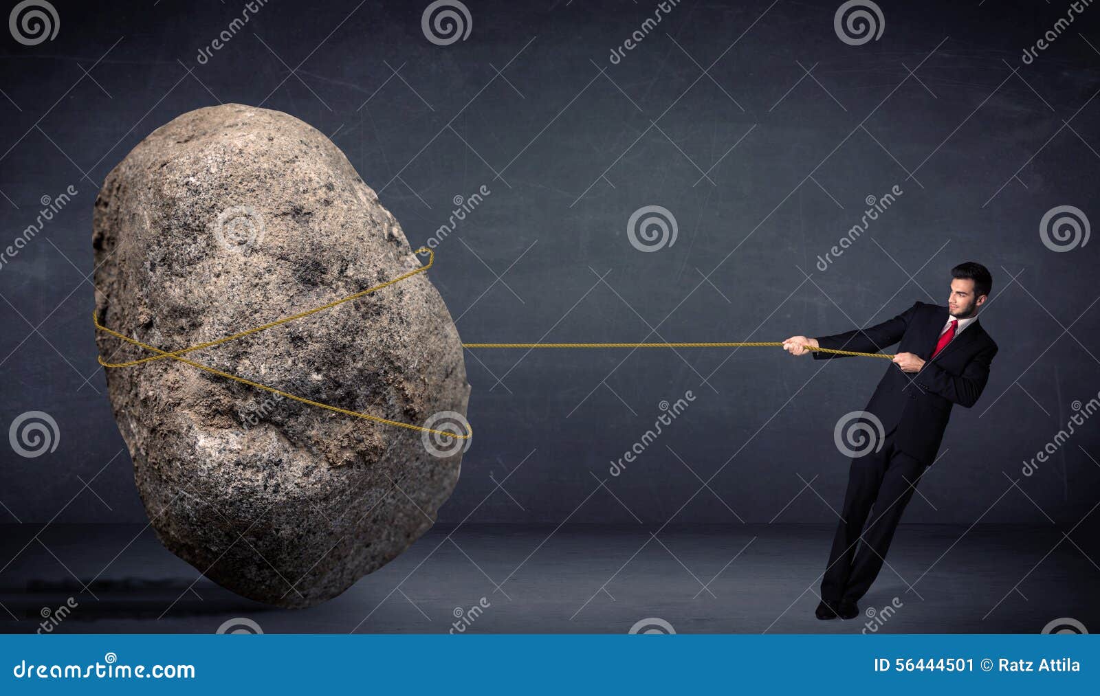 Businessman Pulling Huge Rock with a Rope Stock Image - Image of ...