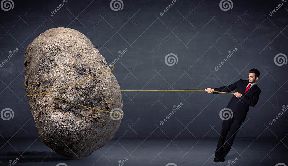 Businessman Pulling Huge Rock with a Rope Stock Image - Image of ...