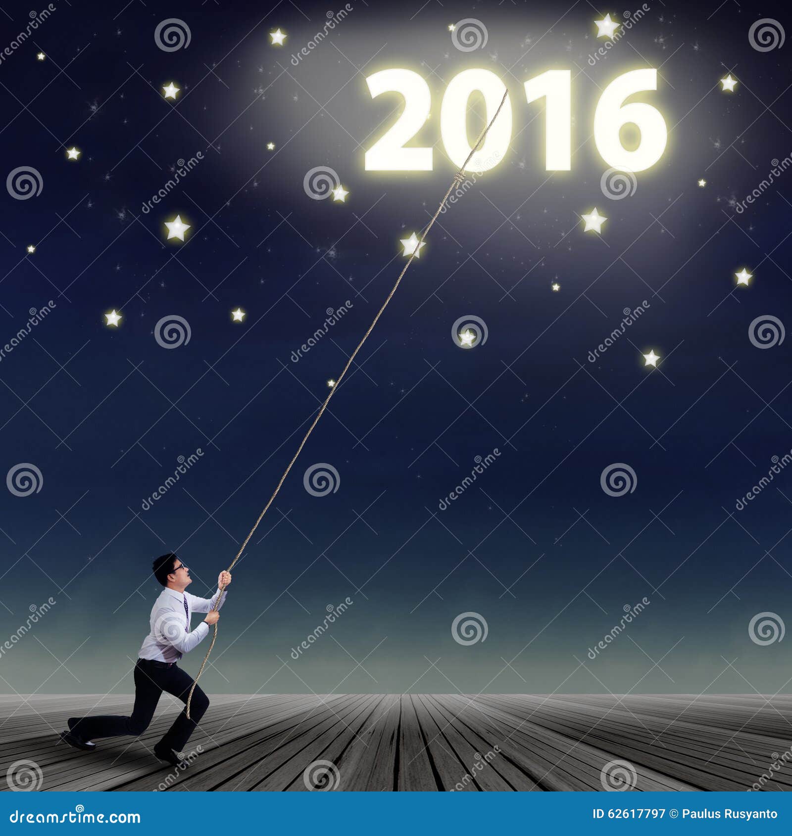 Businessman Pulling Numbers 2016 at the Sky Stock Image - Image of ...