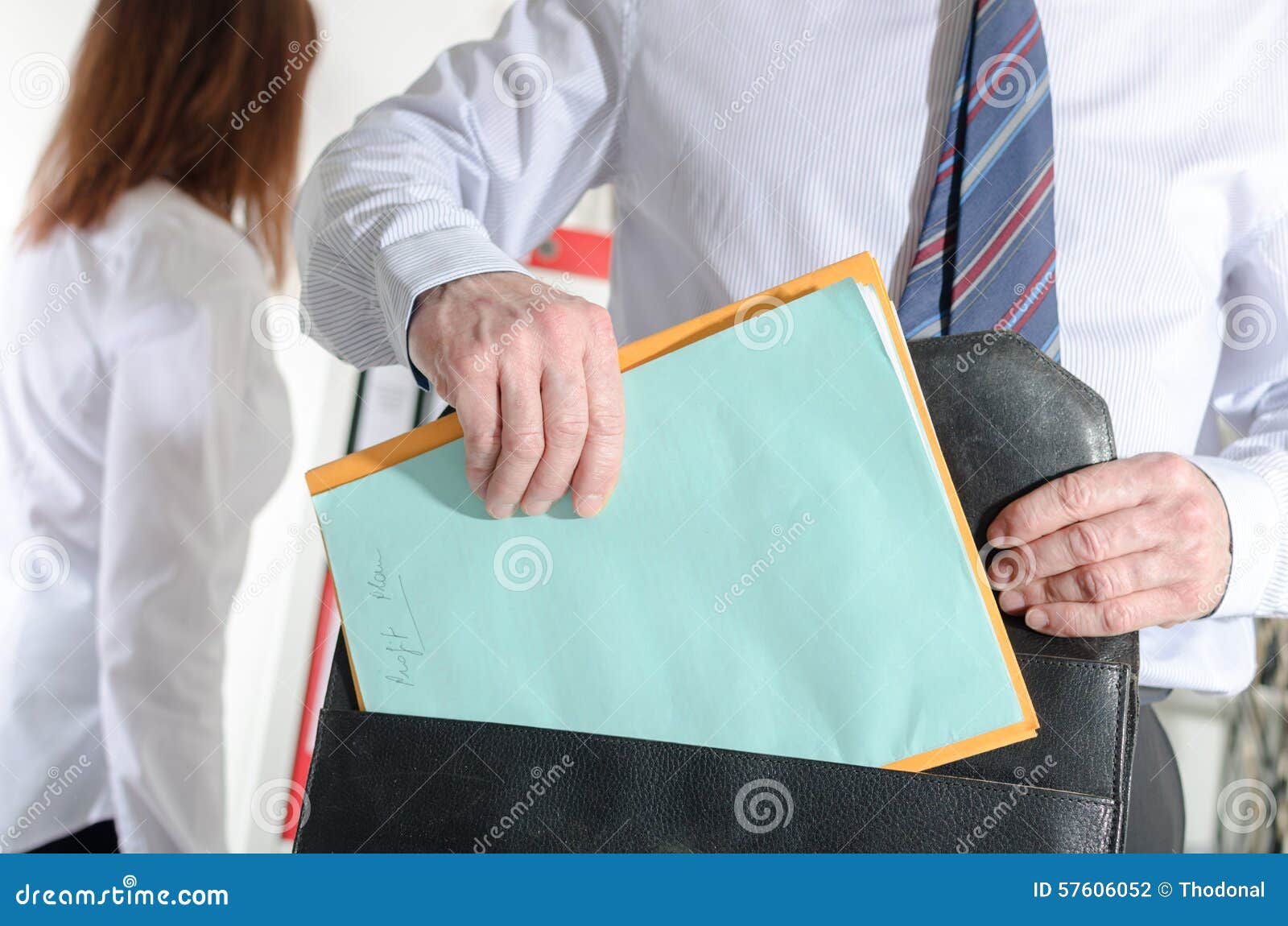 Businessman Pulling Out Folders from His Briefcase Stock Photo - Image ...