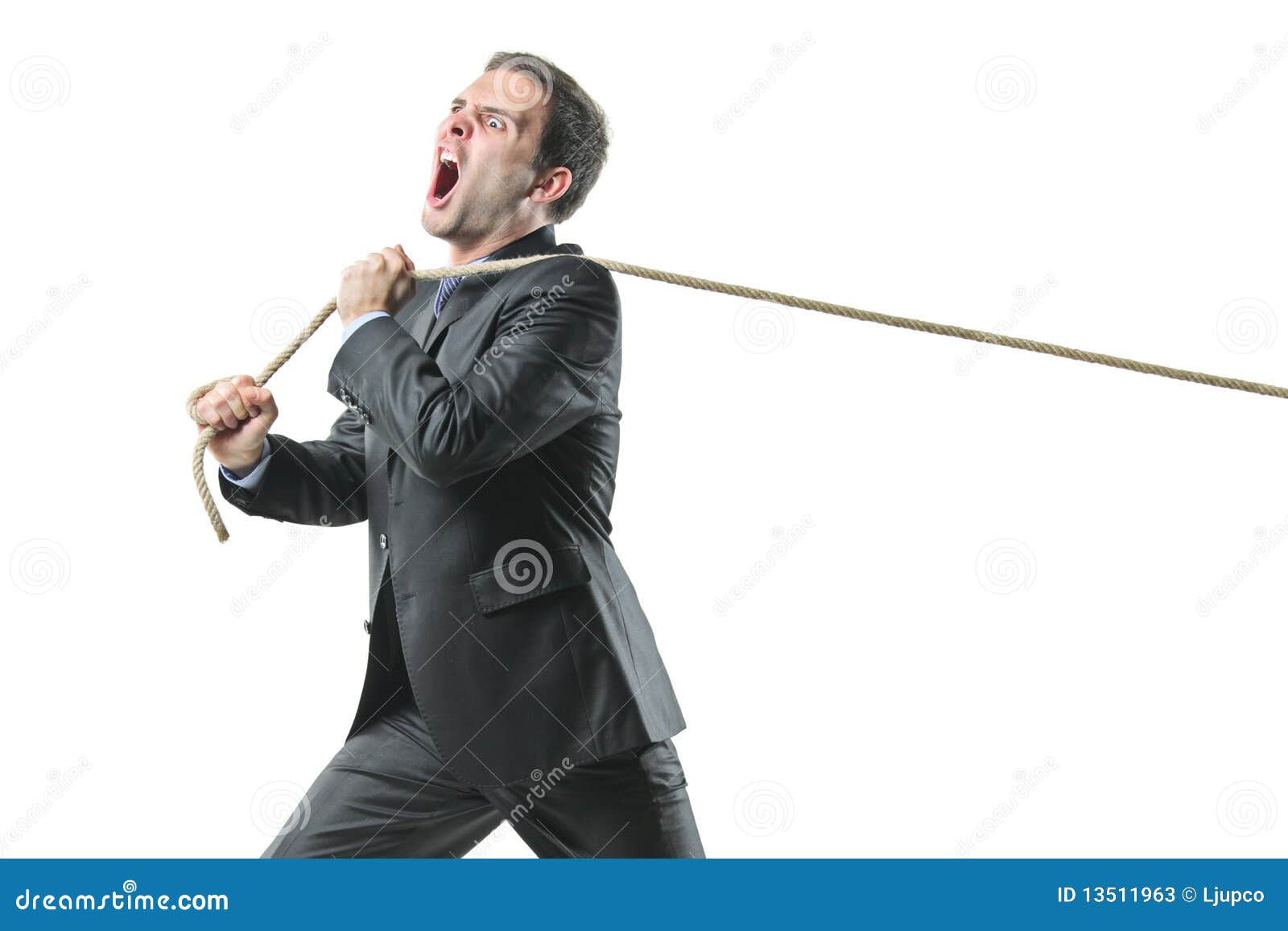 Businessman pulling a rope stock image. Image of difficult - 13511963