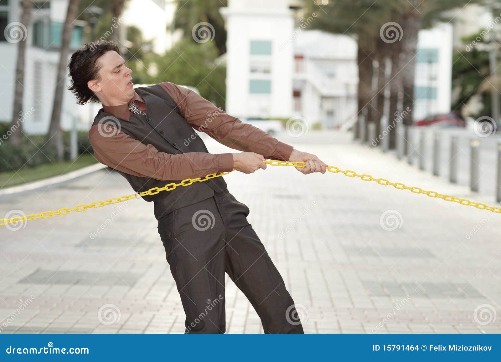 Businessman Pulling on a Rope Stock Photo - Image of daytime, rope ...