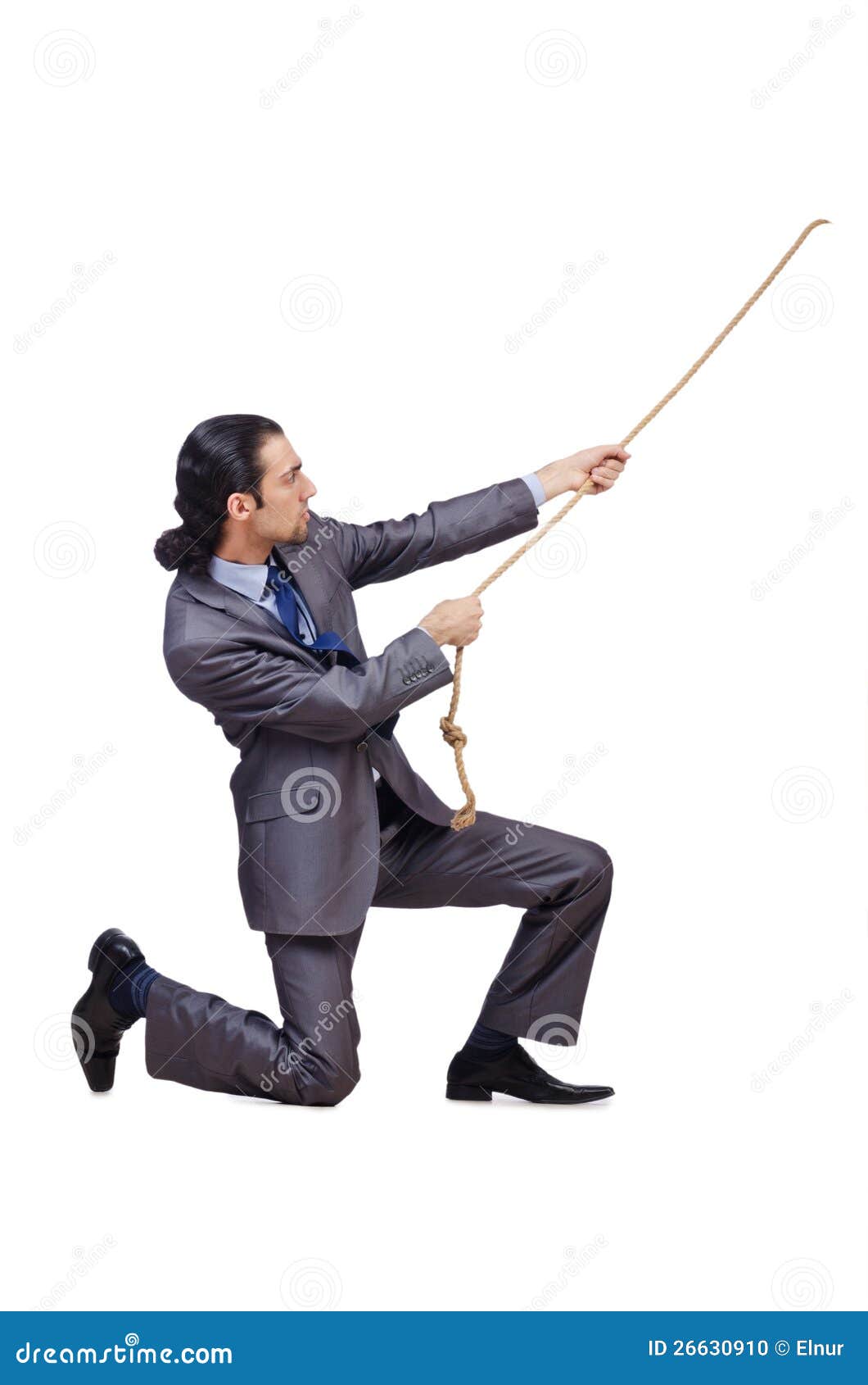 Businessman pulling rope stock photo. Image of power - 26630910