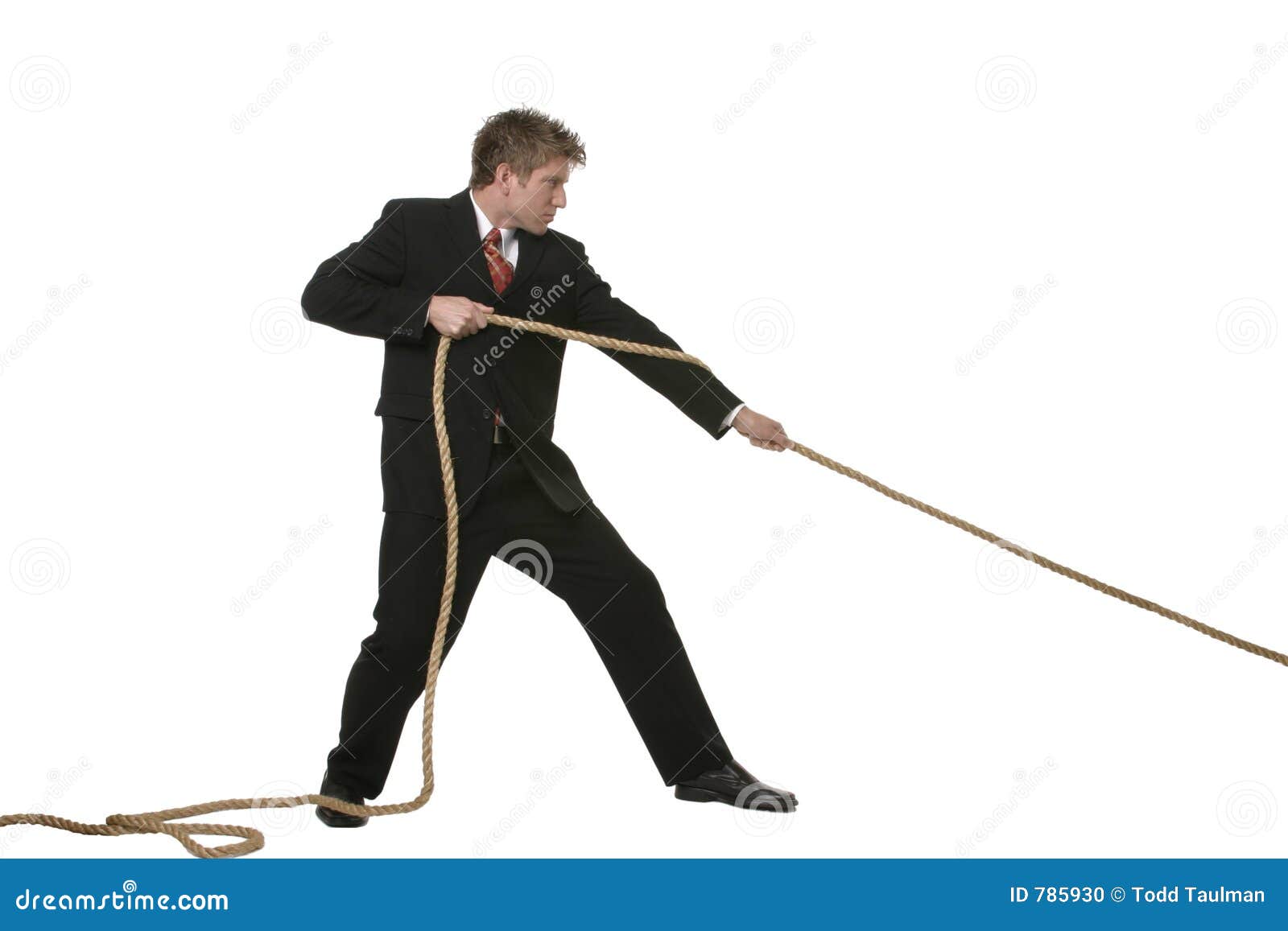 Businessman Pulling On Rope Stock Photo - Image: 785930