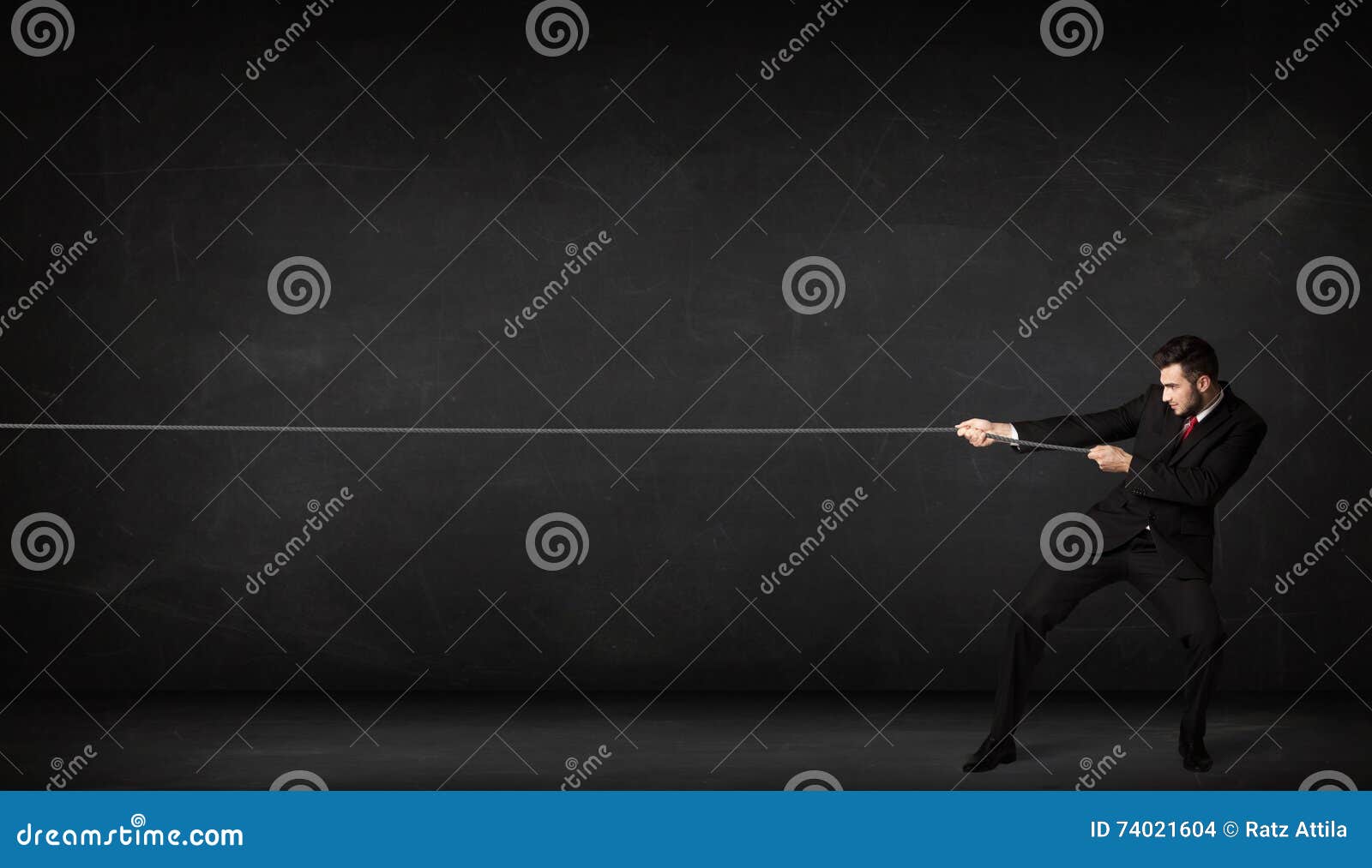 Businessman Pulling Rope on Grey Background Stock Photo - Image of long ...