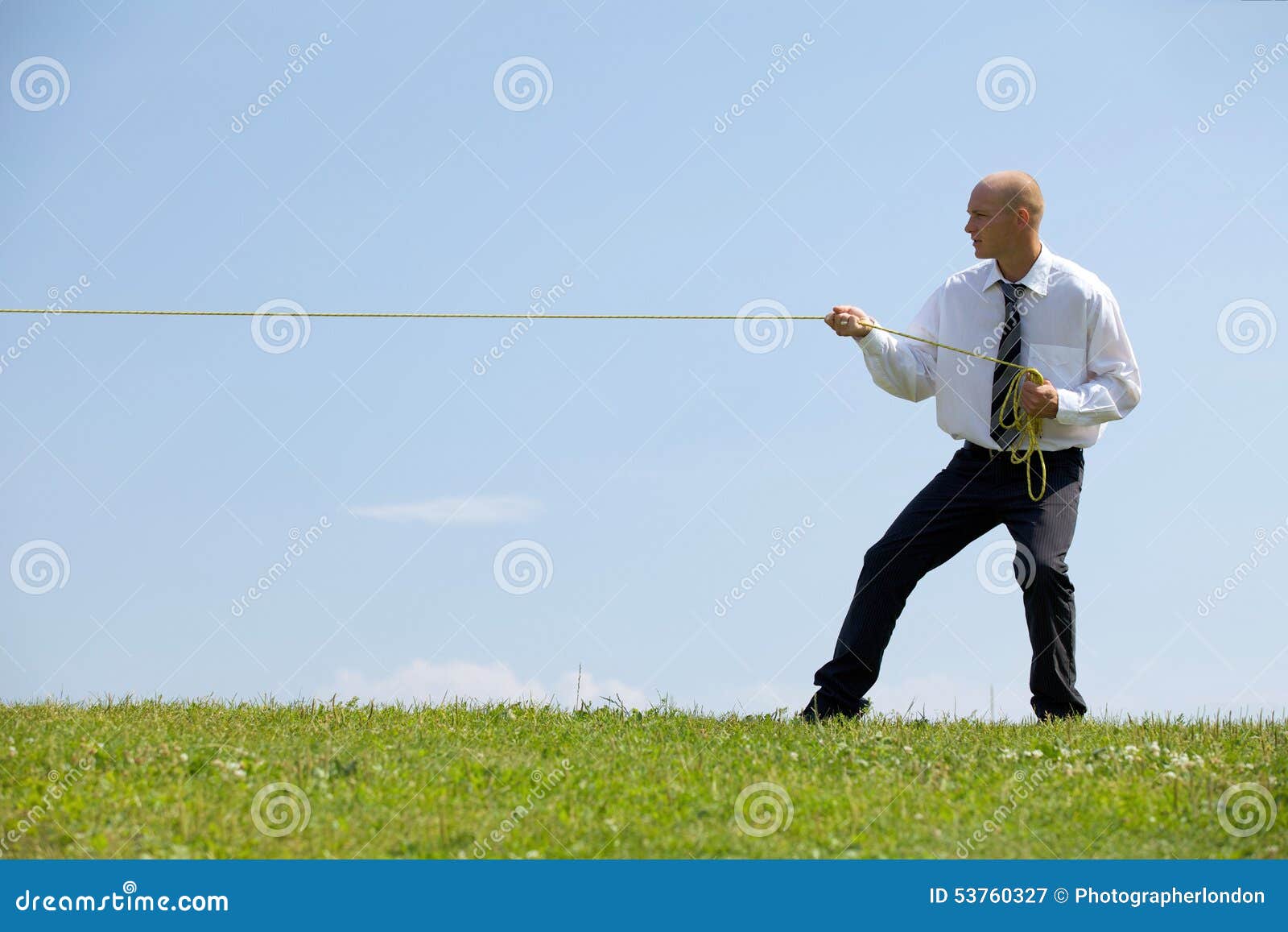 Businessman Pulling Rope in Park Stock Image - Image of leisure ...