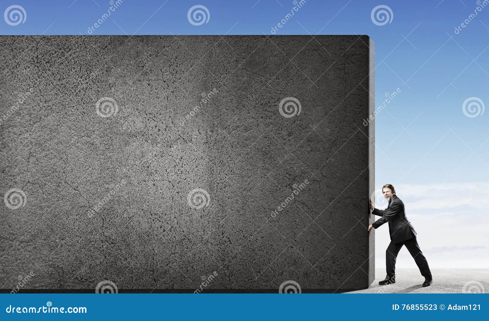 Businessman push wall stock image. Image of standing - 76855523