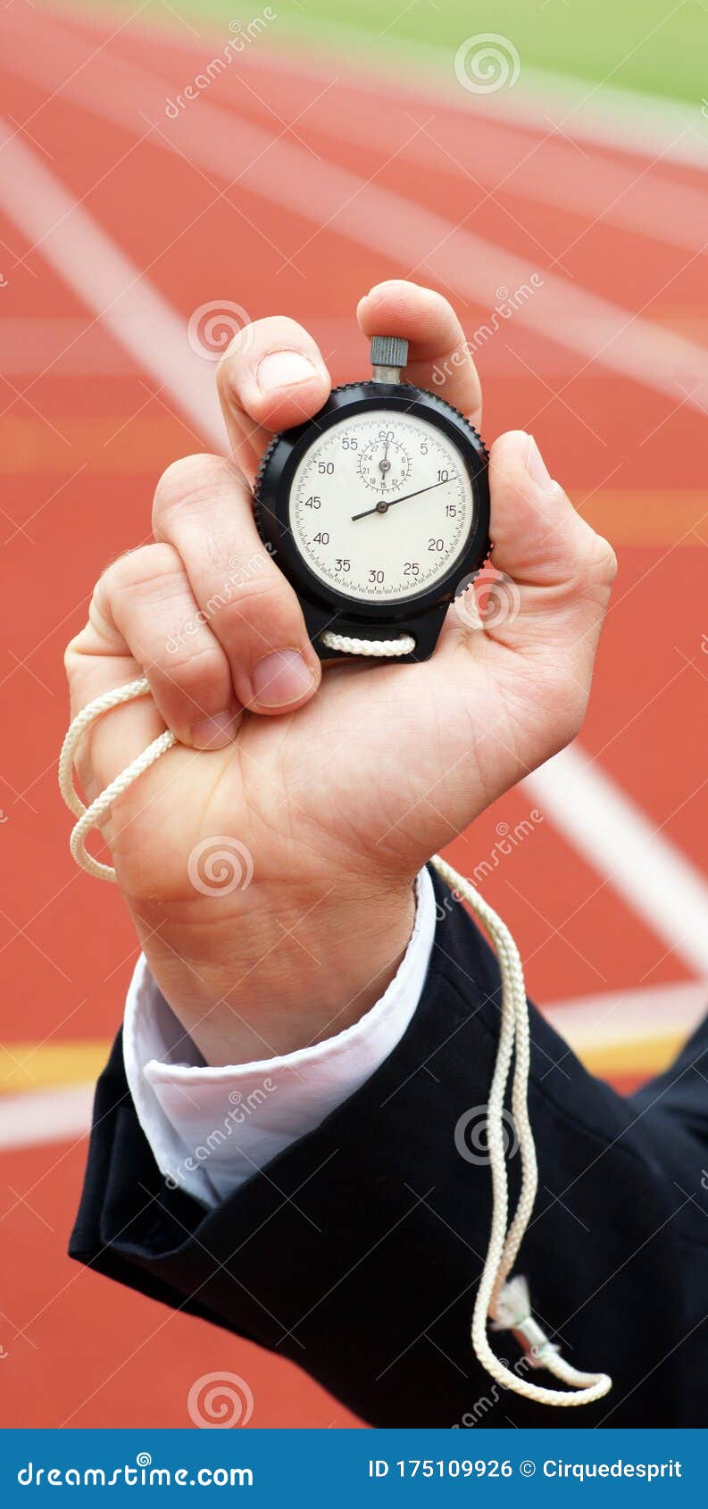 Businessman Pushes Start Button of Stopwatch - Sports Ground in the ... Businessman Pushes Start Button of Stopwatch - Sports Ground in the ...