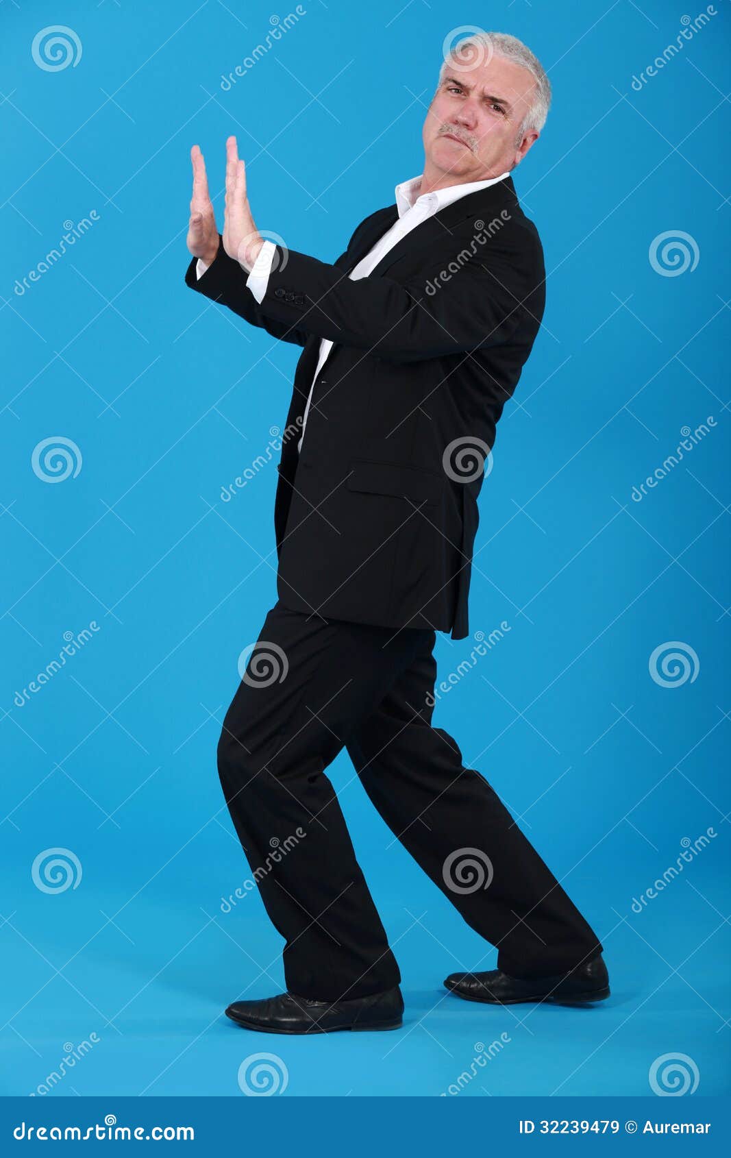 Businessman Pushing Against Something Stock Image - Image of modern ...