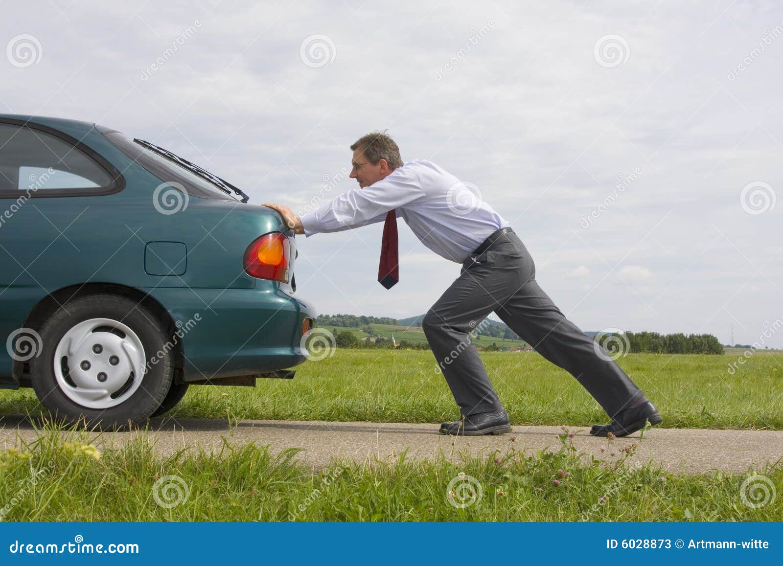 Businessman pushing a car stock image. Image of empty - 6028873 Businessman pushing a car stock image. Image of empty - 6028873