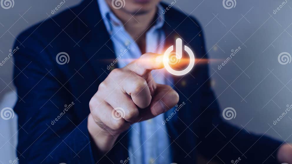 Businessman Pushing Visual Touch Screen Power Button with His Finger ...