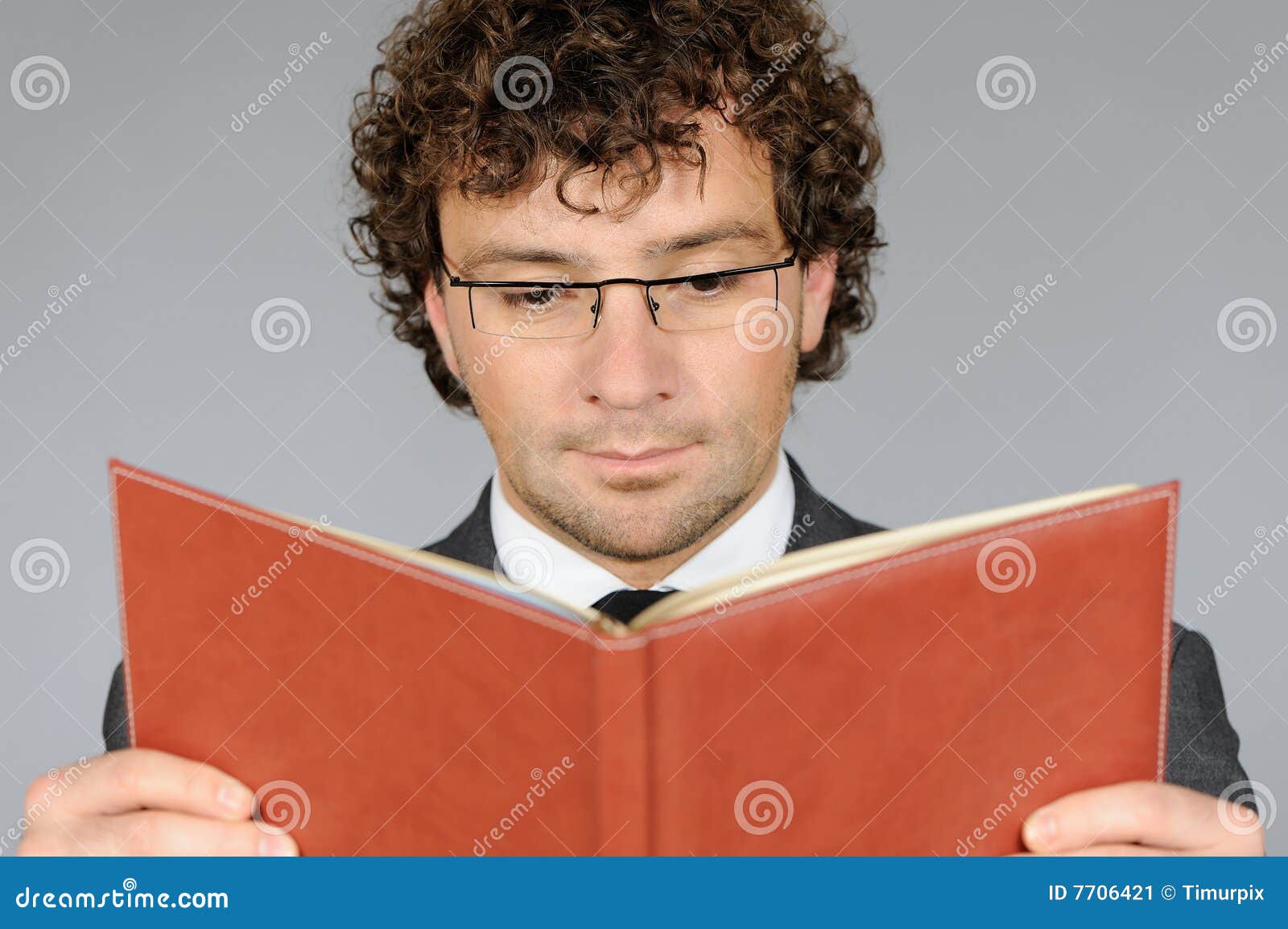 Businessman reading book stock image. Image of organizer - 7706421