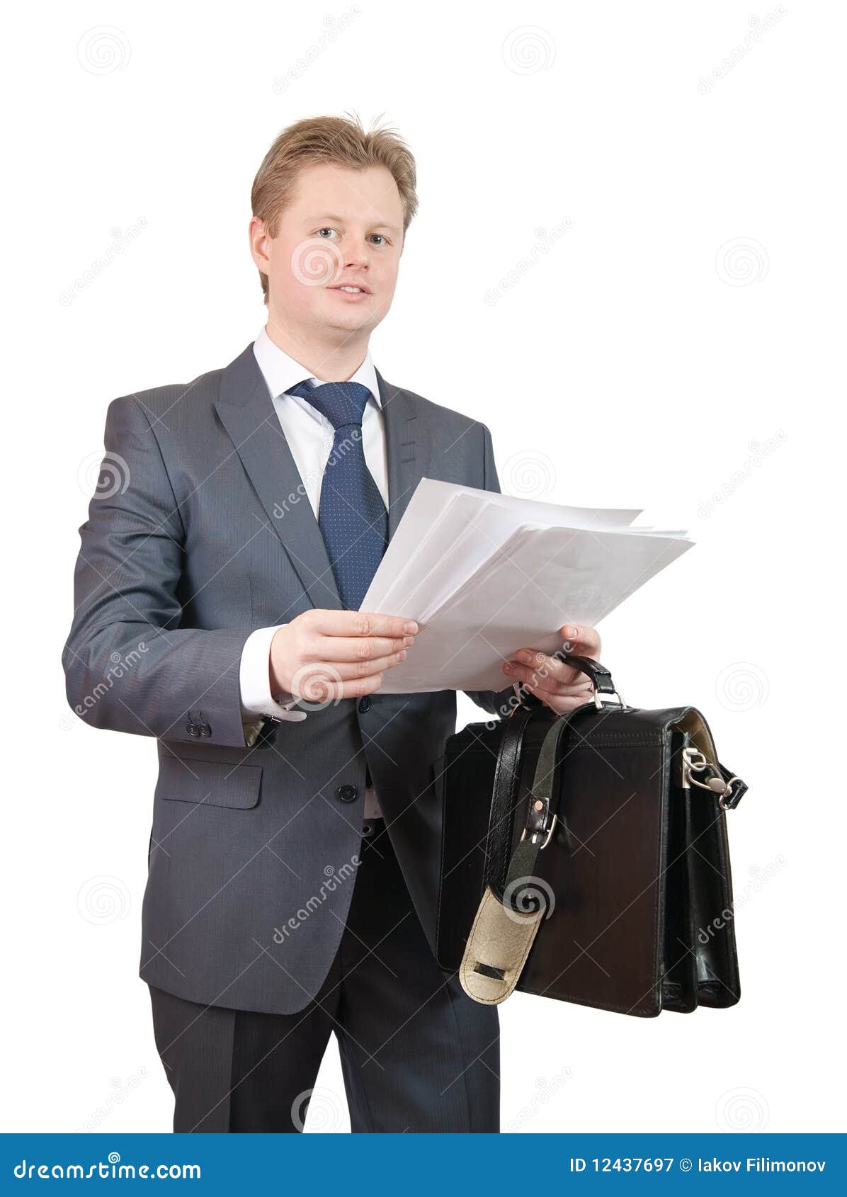 Businessman Reading Documents Stock Image - Image of handsome ...