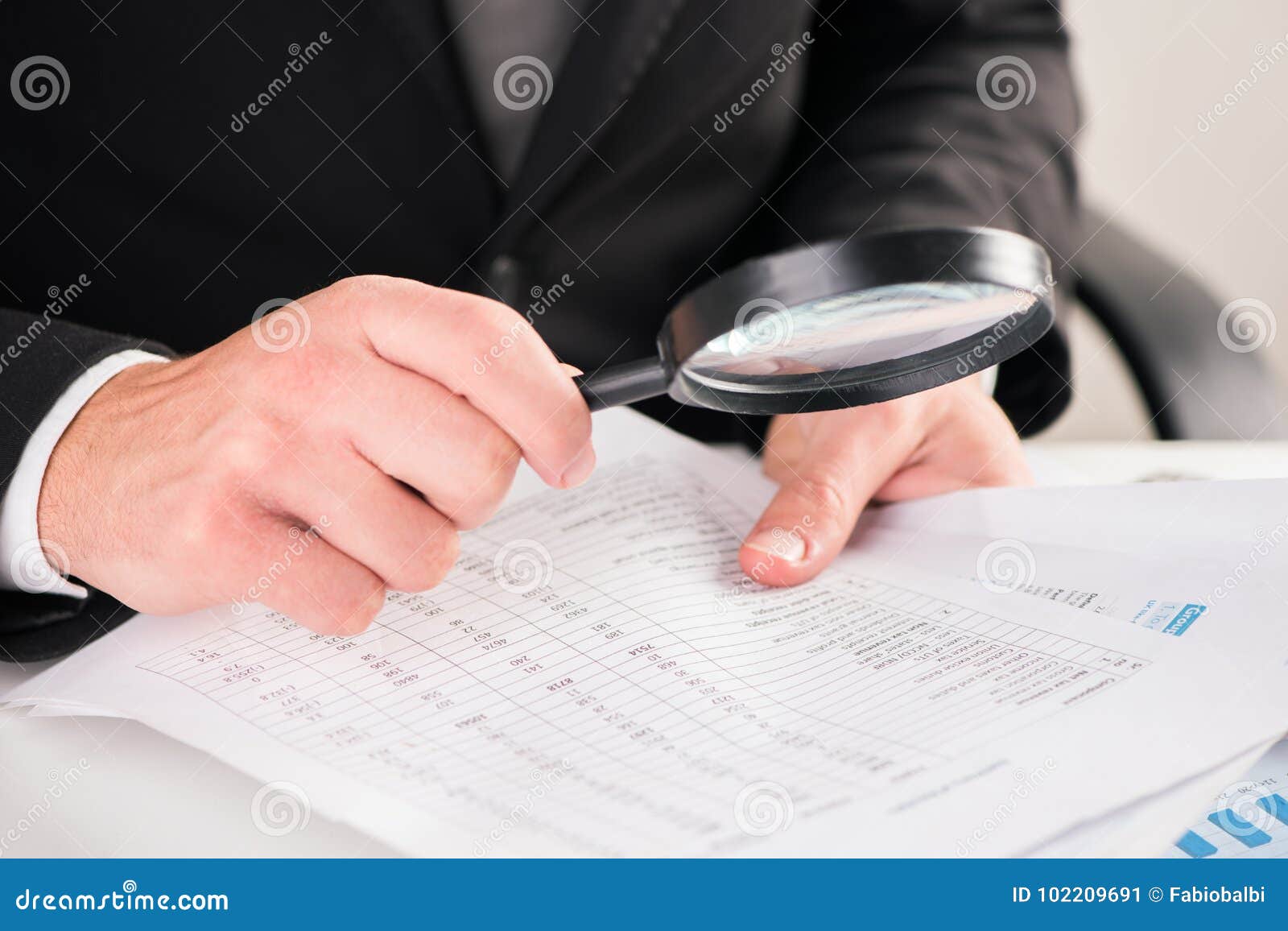 Businessman Reading Documents with Magnifying Glass Stock Image - Image ... Businessman Reading Documents with Magnifying Glass Stock Image - Image ...