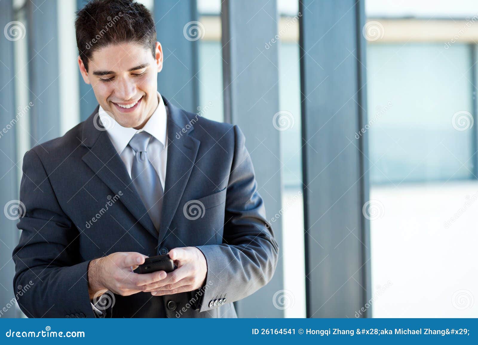 Businessman reading emails stock image. Image of bright - 26164541