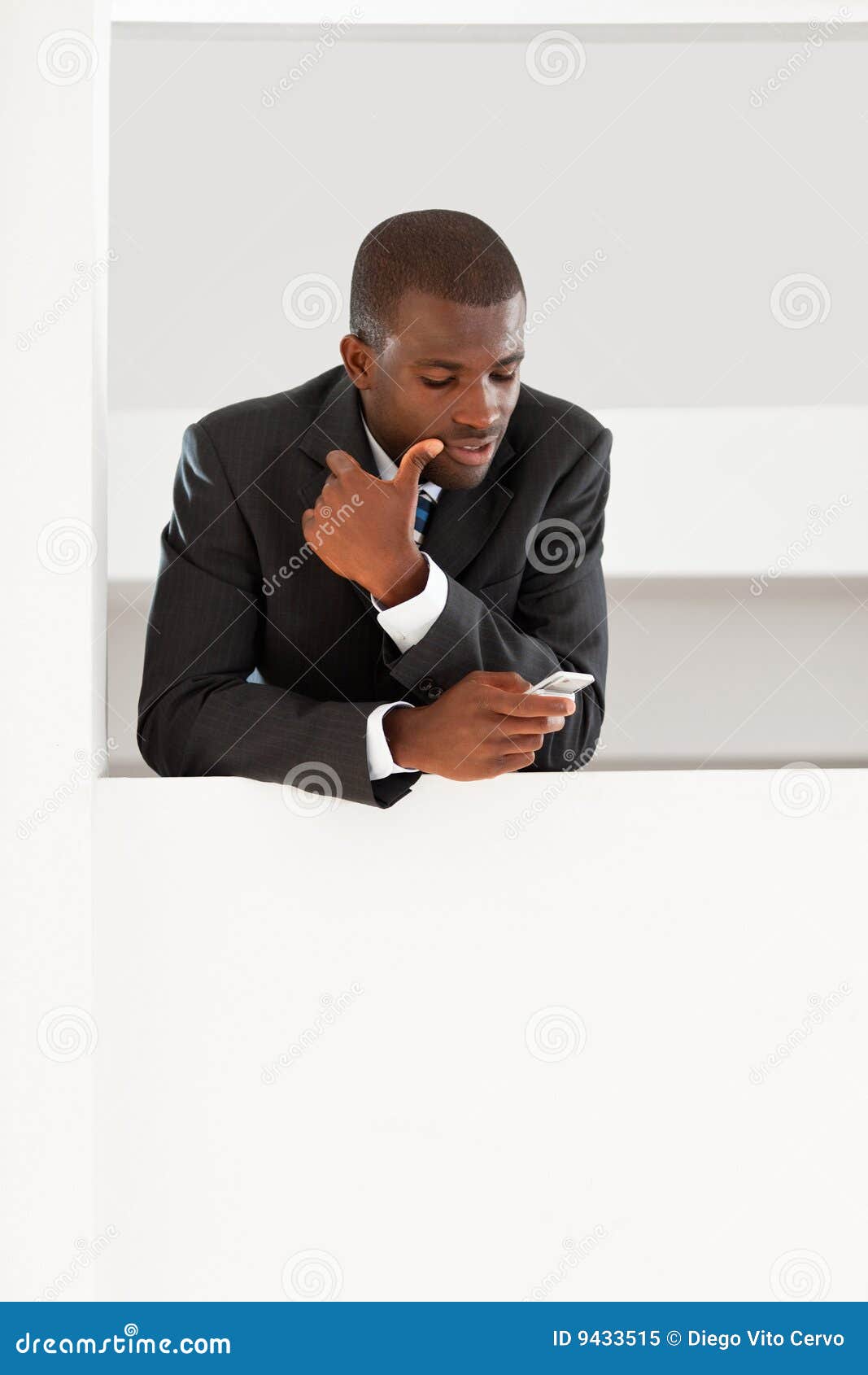 Businessman reading emails stock image. Image of holding - 9433515