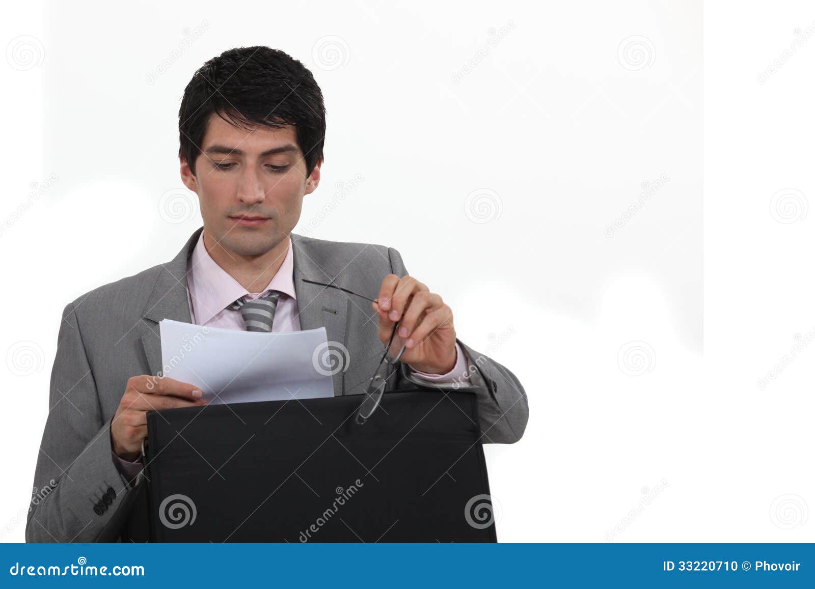 Businessman Reading His Notes Stock Photo - Image of paperwork, reading ...