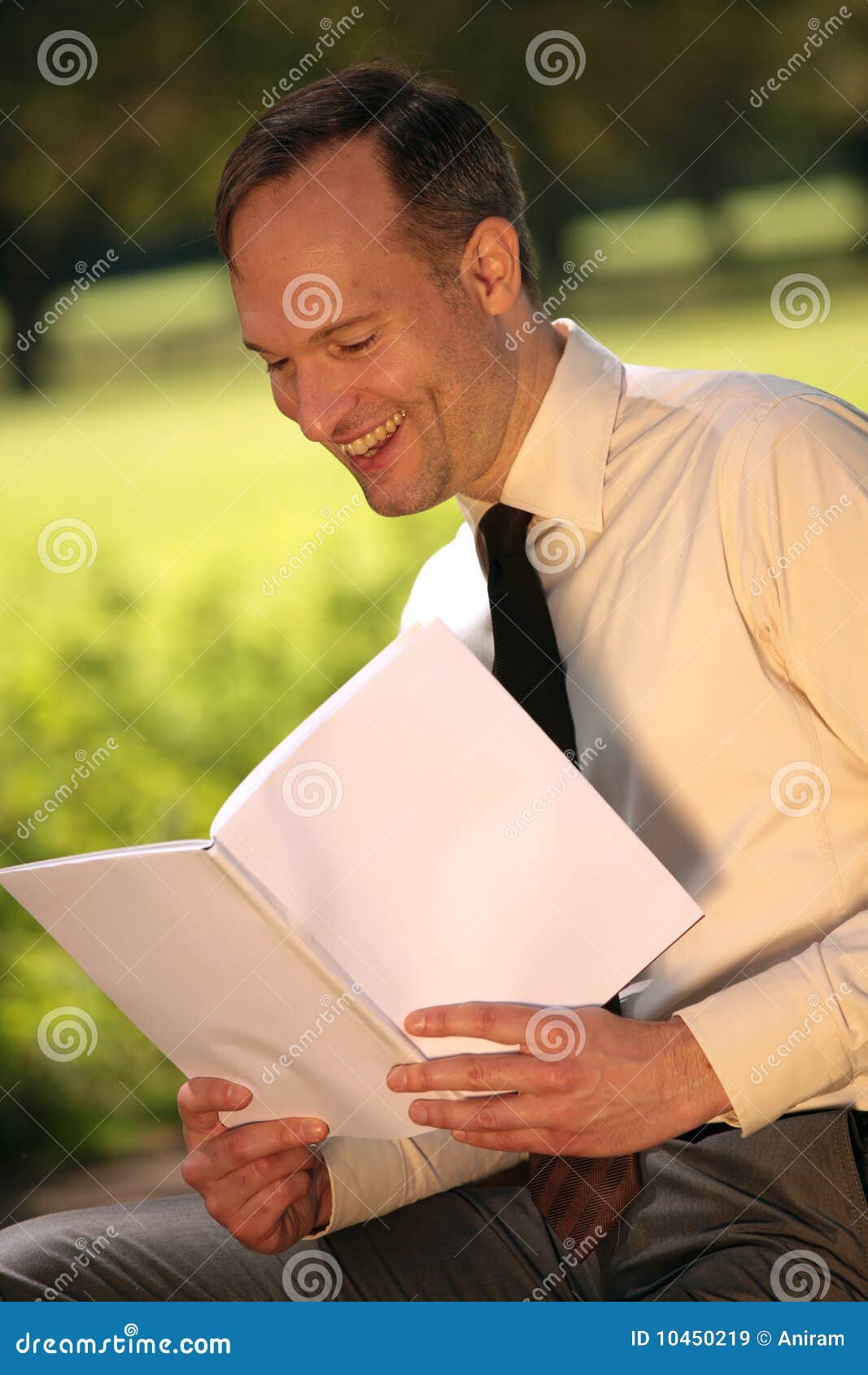 Businessman Reading Magazine Stock Image - Image of journal, newspaper ...