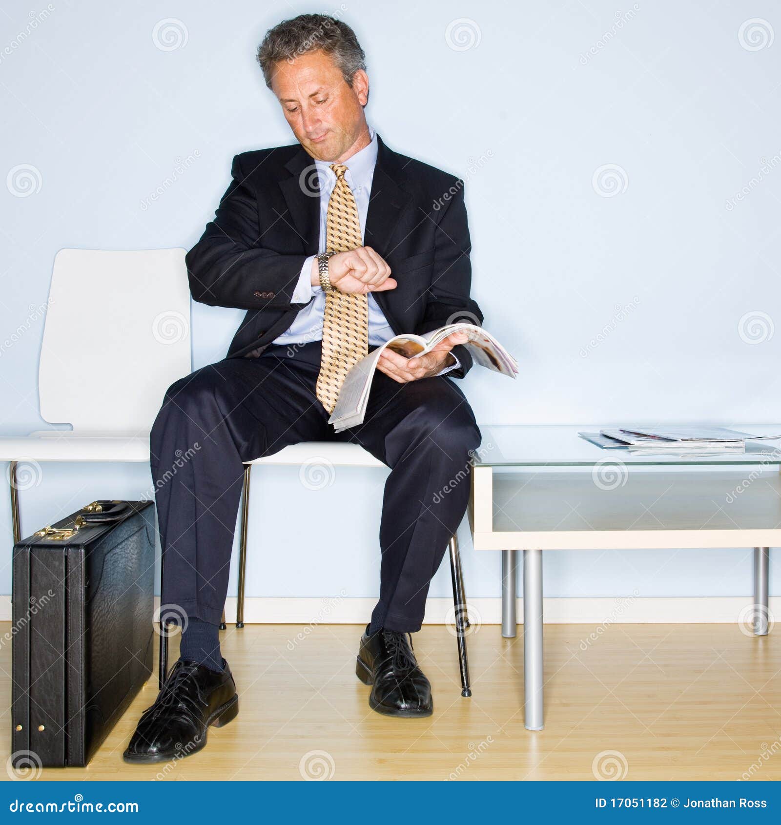 Businessman Reading Magazine in Waiting Room Stock Photo - Image of ...