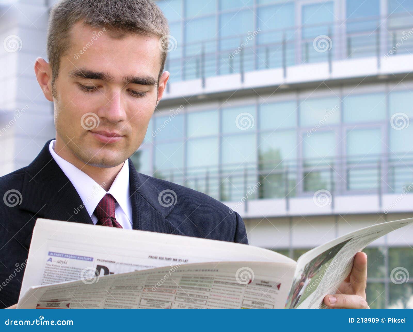 Businessman Reading Newspaper Stock Image - Image of reading, outdoors ...