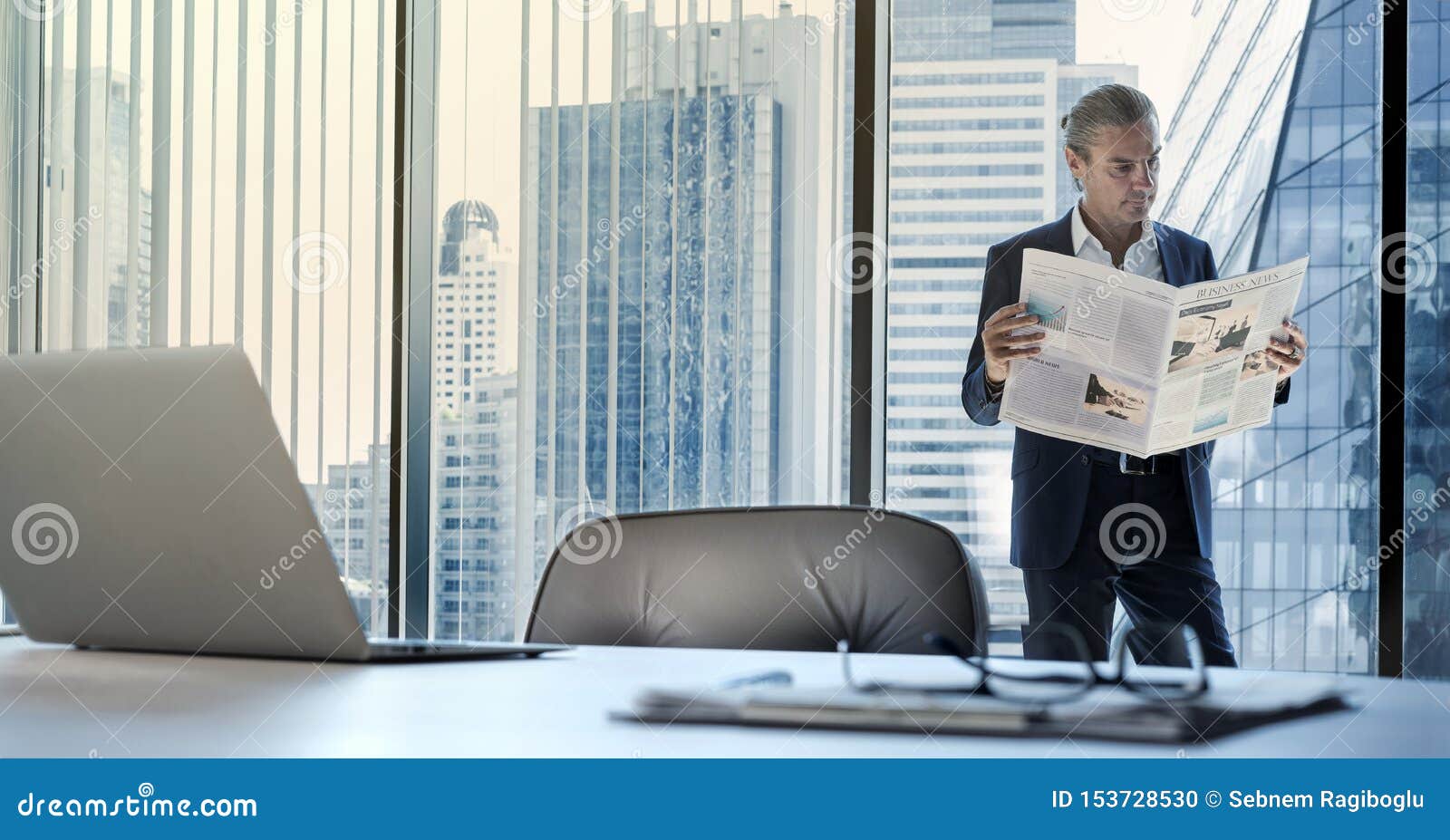 Businessman Reading Newspaper at Office Stock Photo - Image of boss ... Businessman Reading Newspaper at Office Stock Photo - Image of boss ...
