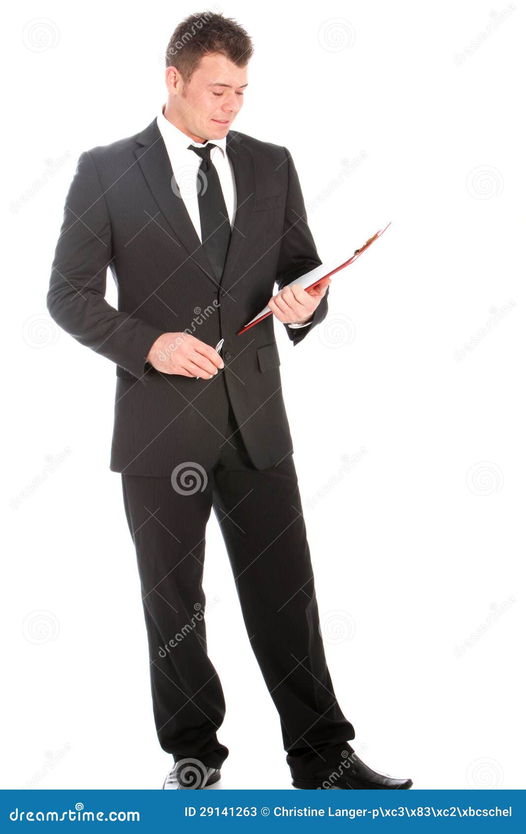 Businessman Reading Notes on a Clipboard Stock Image - Image of ...