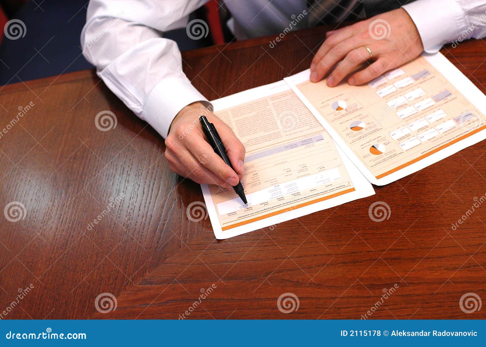 Businessman Reads Financial Report 1 Stock Photo - Image of write ...