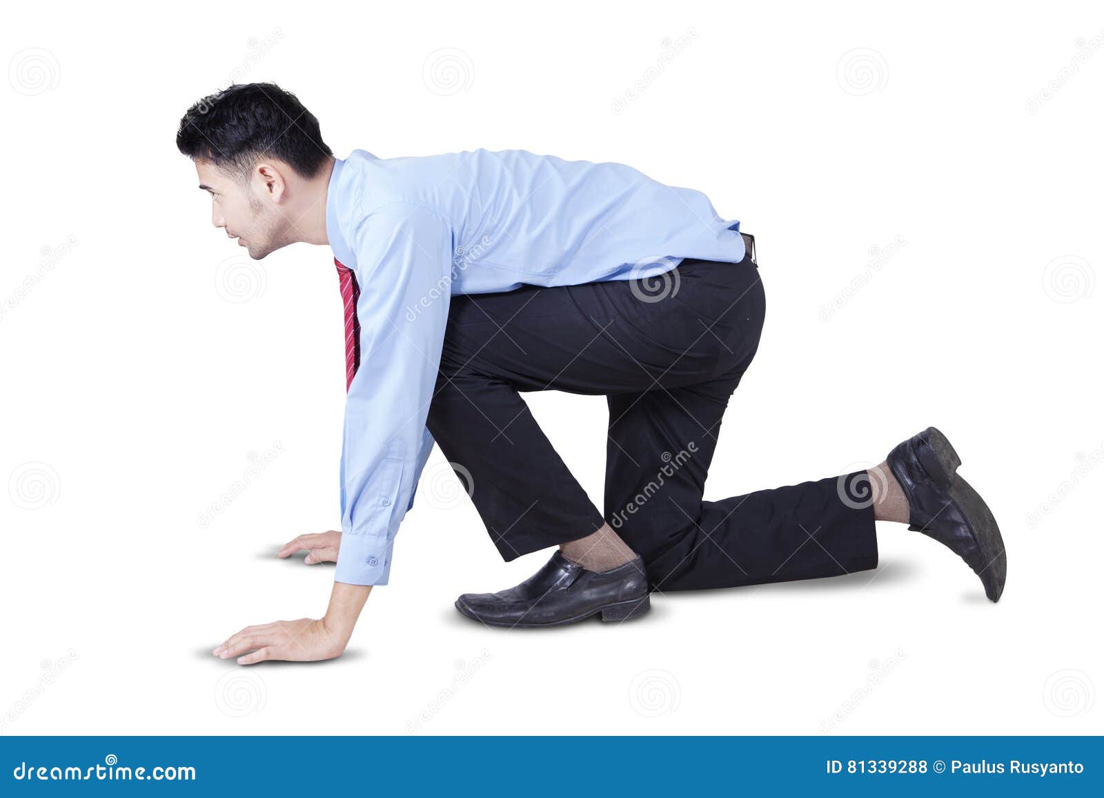 Businessman in Ready Position for Competing Stock Photo - Image of ...