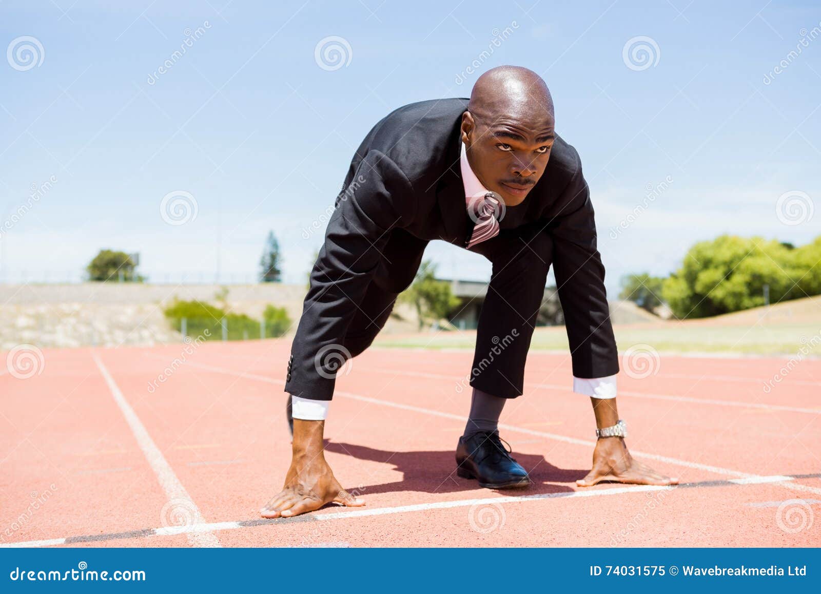 Businessman ready to run stock image. Image of future - 74031575