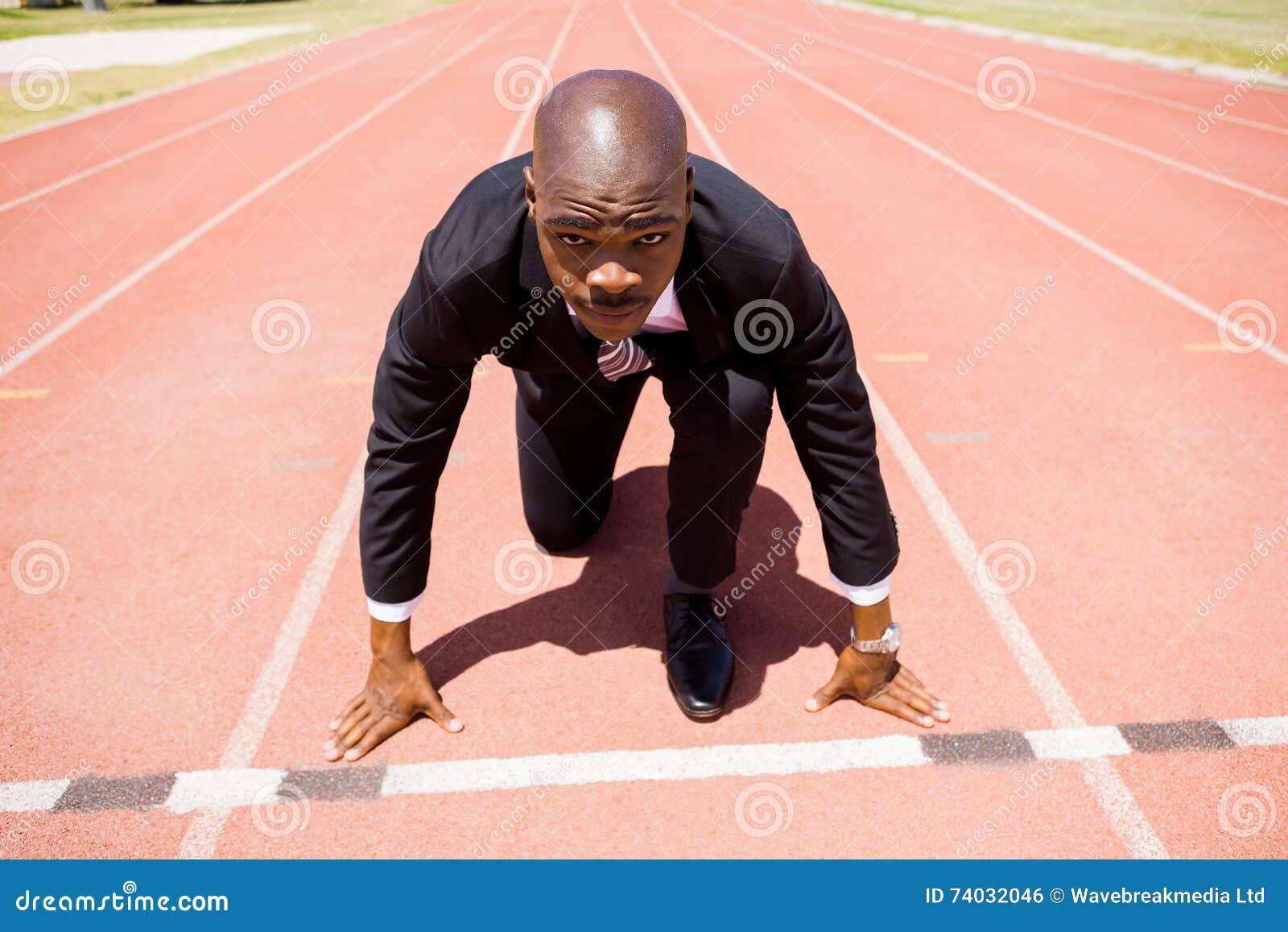 Businessman ready to run stock photo. Image of businessman - 74032046