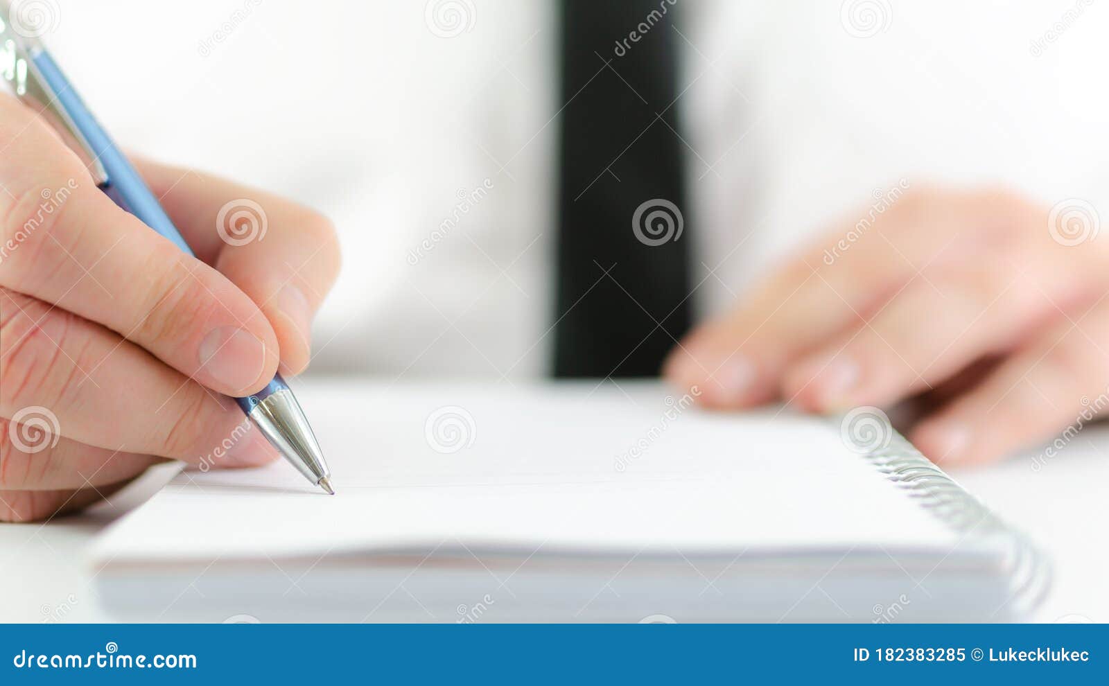 Businessman Ready To Take Notes on an Empty Note Pad Stock Image ...