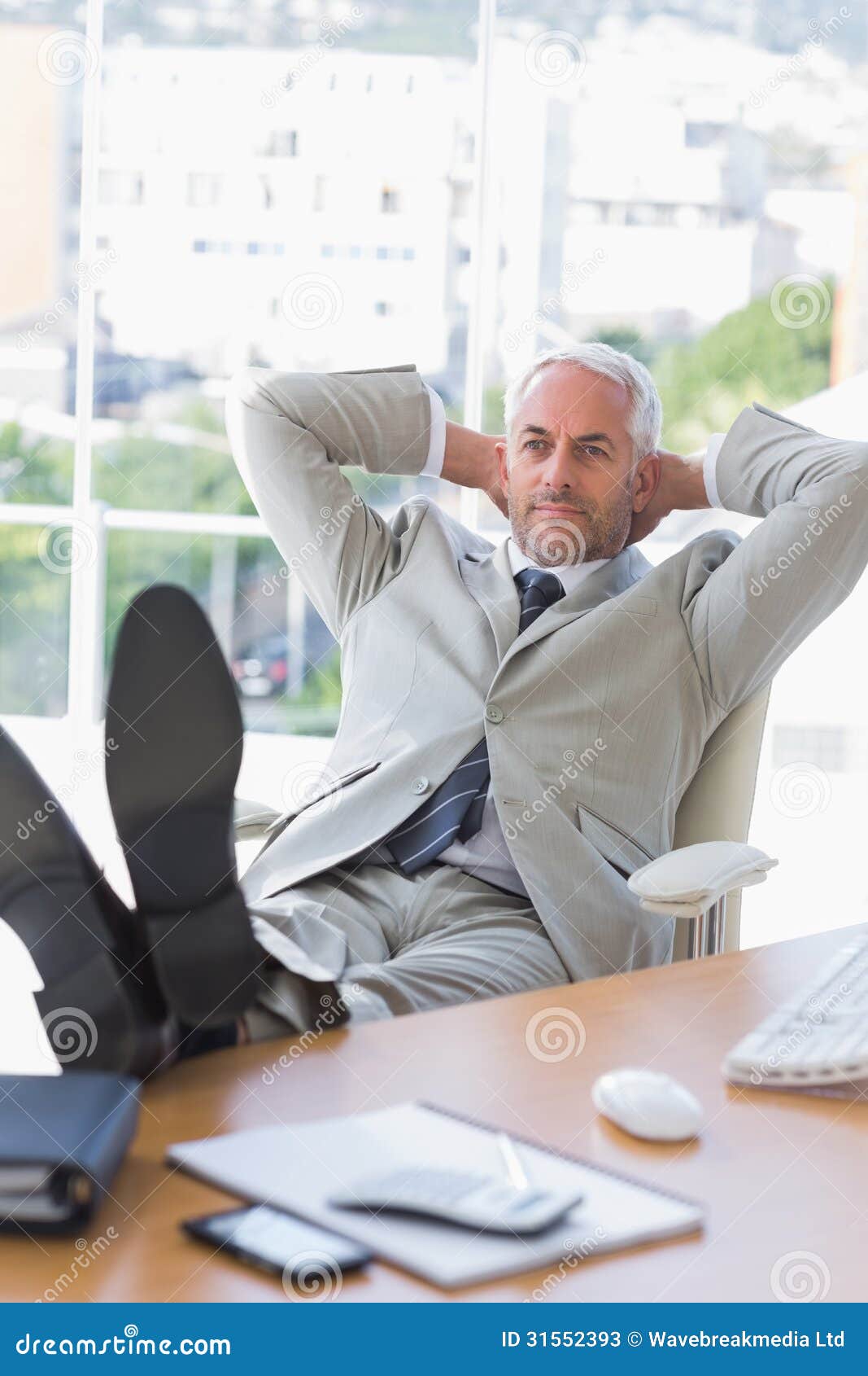 Businessman Relaxing at His Desk Stock Image - Image of handsome ...