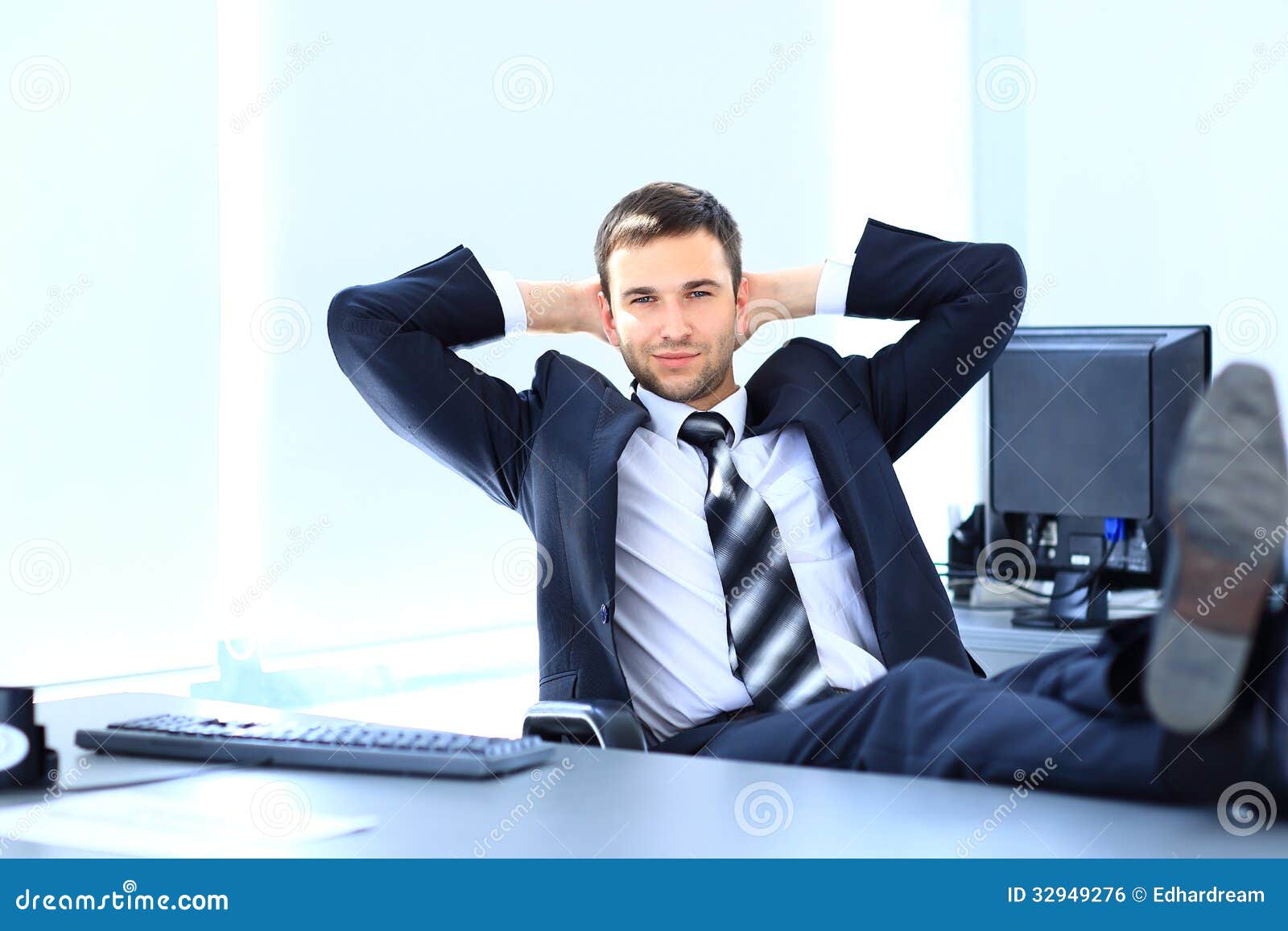 Businessman Relaxing in His Office Stock Photo - Image of modern ...