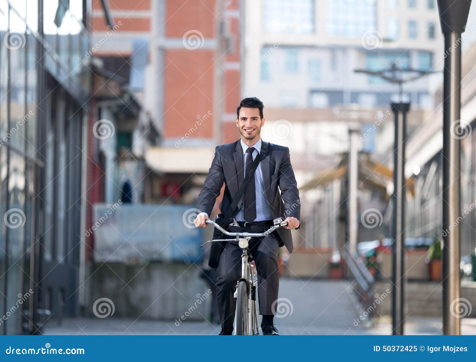 Businessman Riding Bicycle on Street Stock Image - Image of business ...