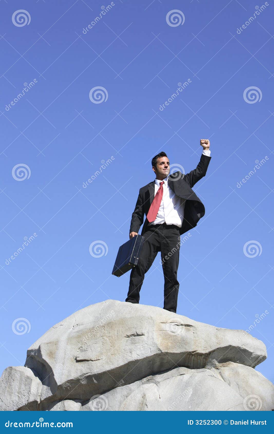 Businessman on rock stock photo. Image of relaxation, achieve - 3252300