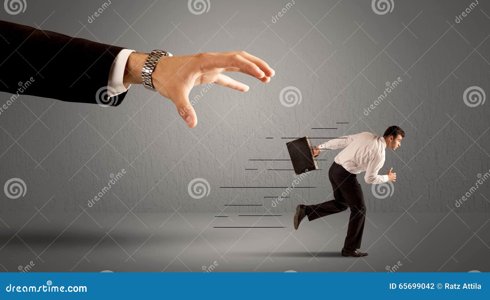 Businessman Running Away from a Huge Hand Stock Photo - Image of effort ...