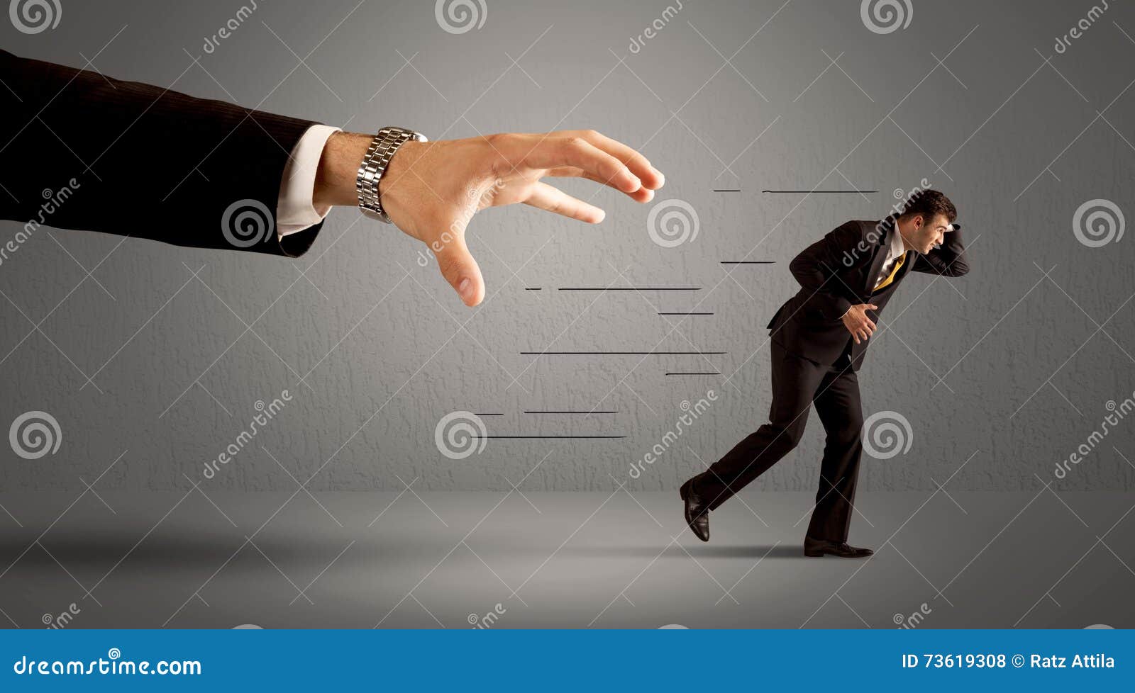 Businessman Running Away from a Huge Hand Stock Photo - Image of ...