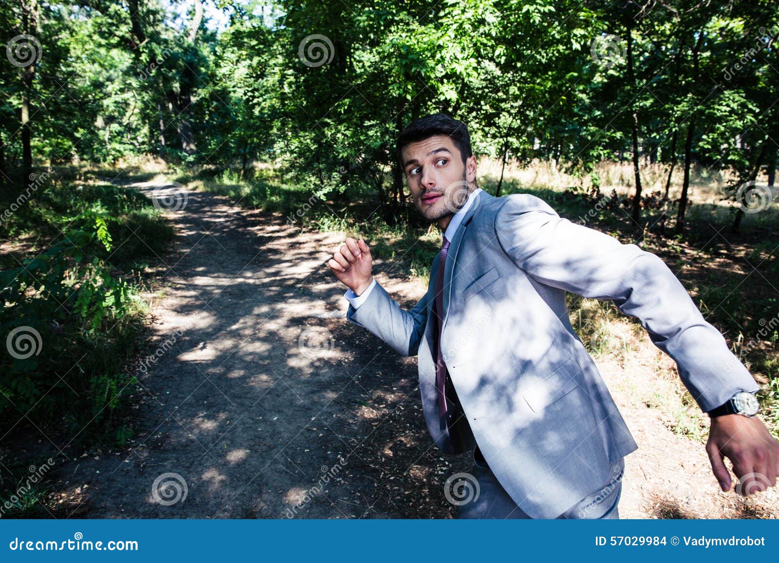 Businessman Running Away from Something Stock Photo - Image of ...