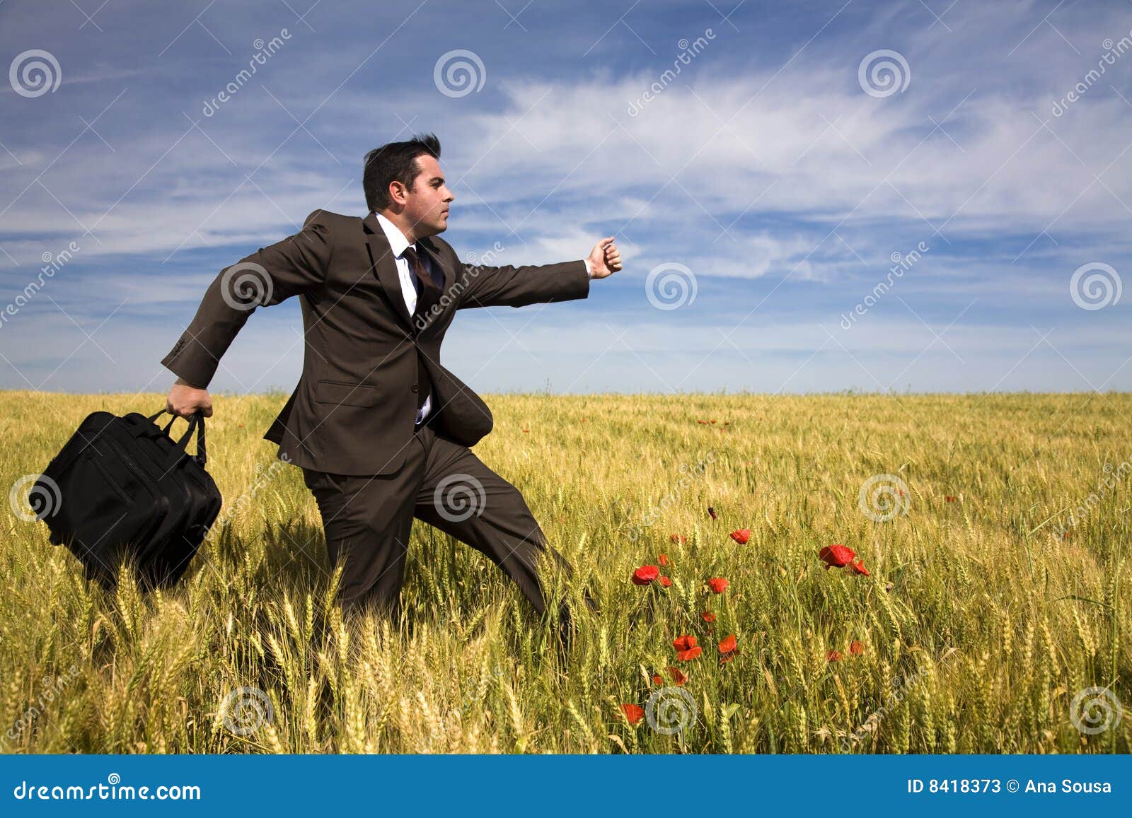 Businessman Running in a Field Stock Image - Image of field, relaxation ...