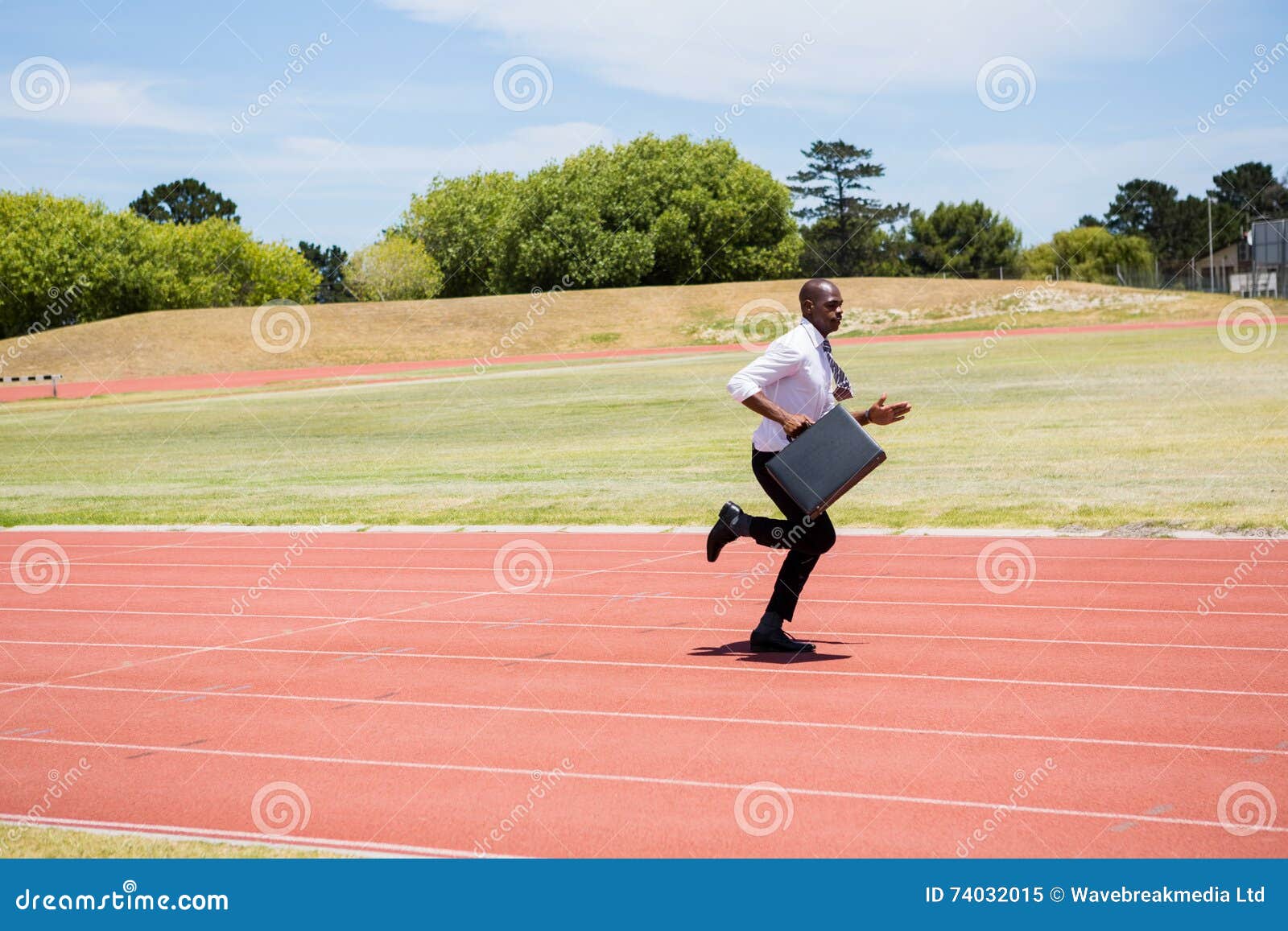 Businessman Running on a Running Track Stock Image - Image of ...
