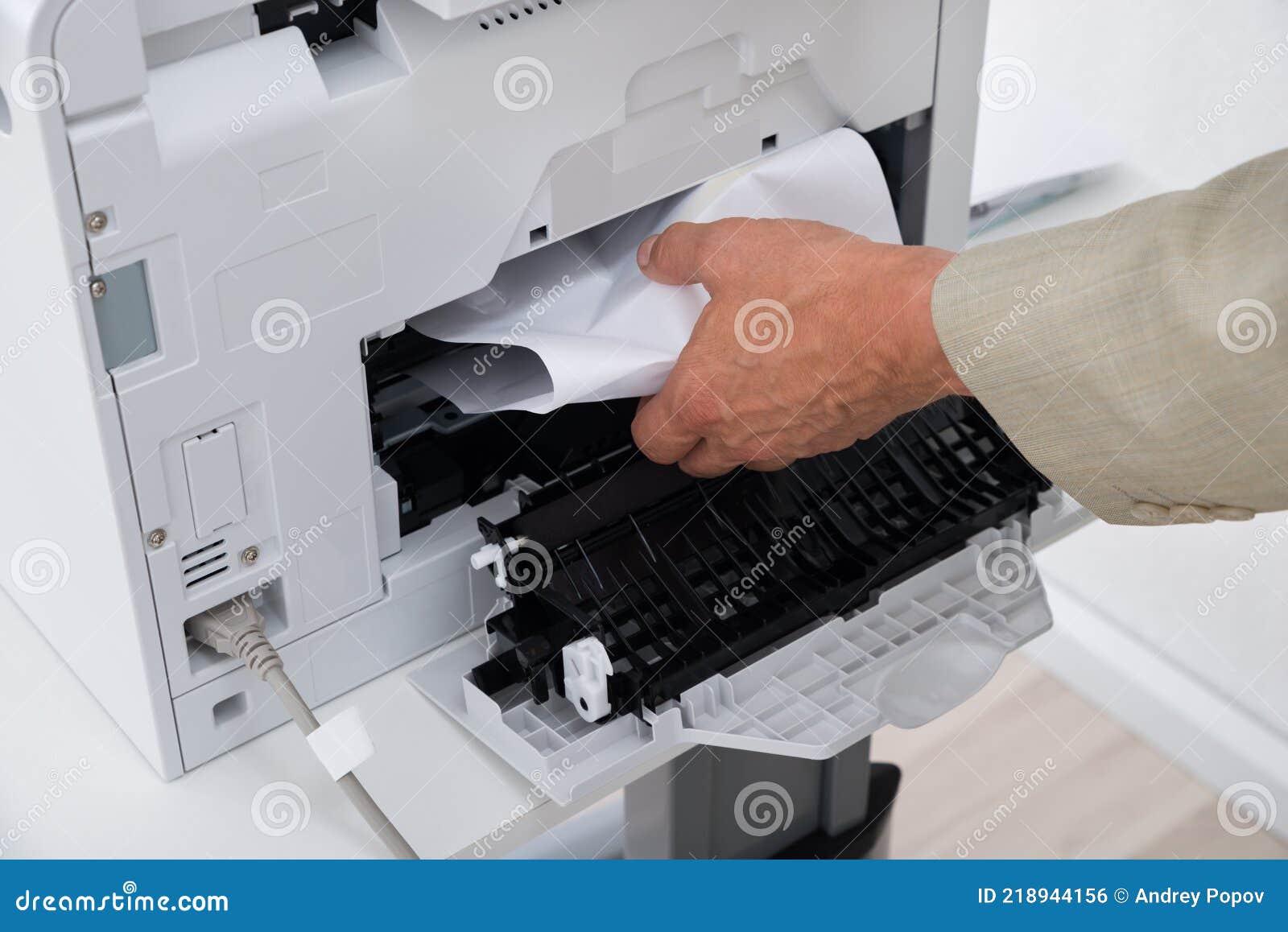 Businessman`s Hand Removing Paper Stuck in Printer Stock Photo - Image ... Businessman`s Hand Removing Paper Stuck in Printer Stock Photo - Image ...