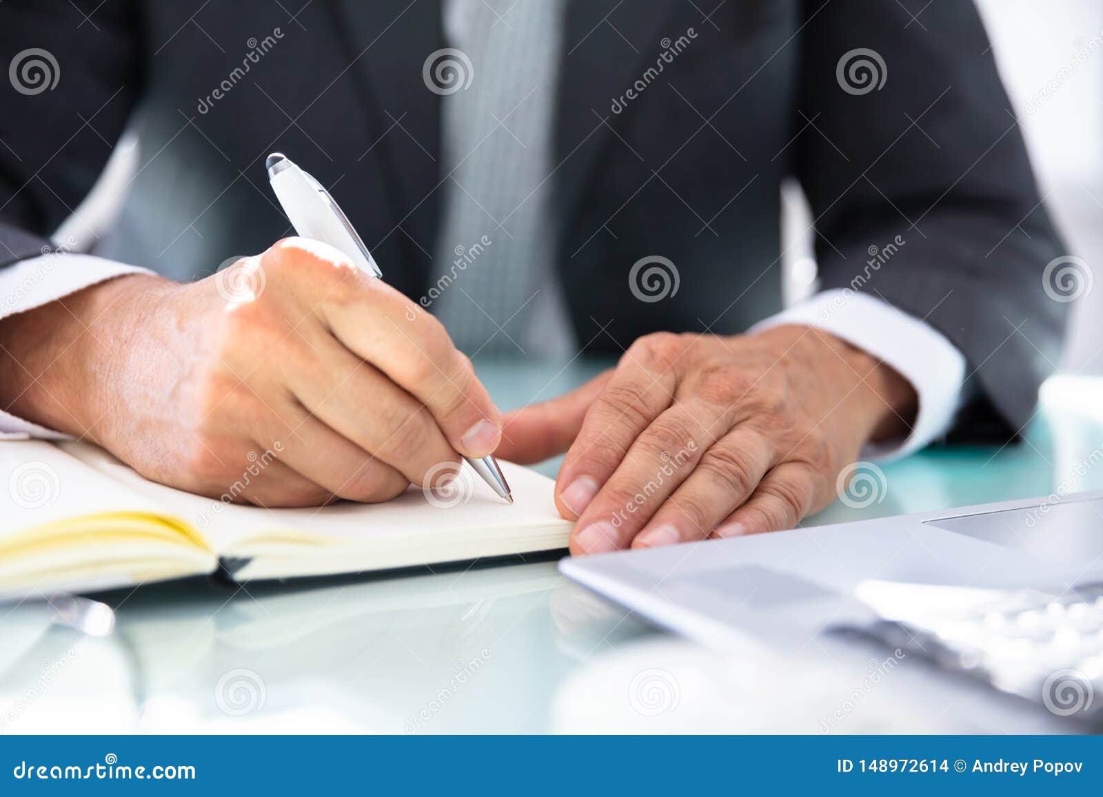 Businessman Writing Schedule in Diary Stock Photo - Image of person ...