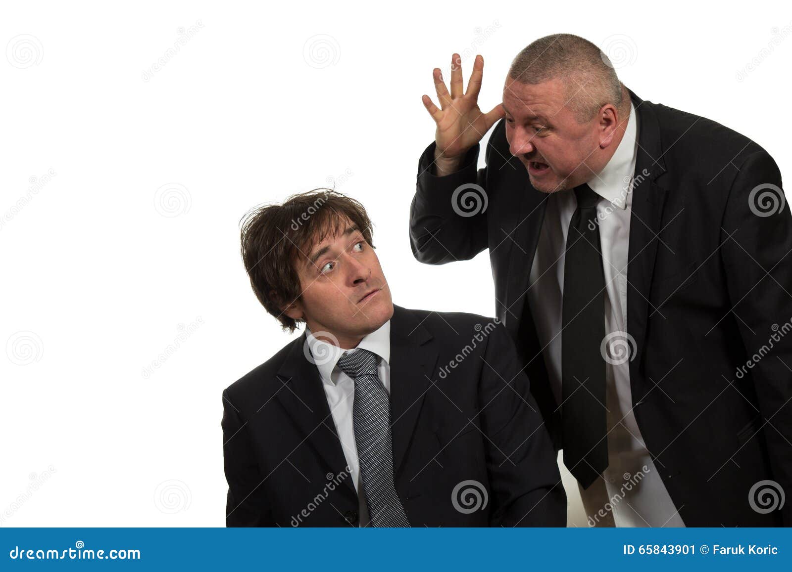 Businessman Screaming and Fighting at a Young Colleague Stock Image ...