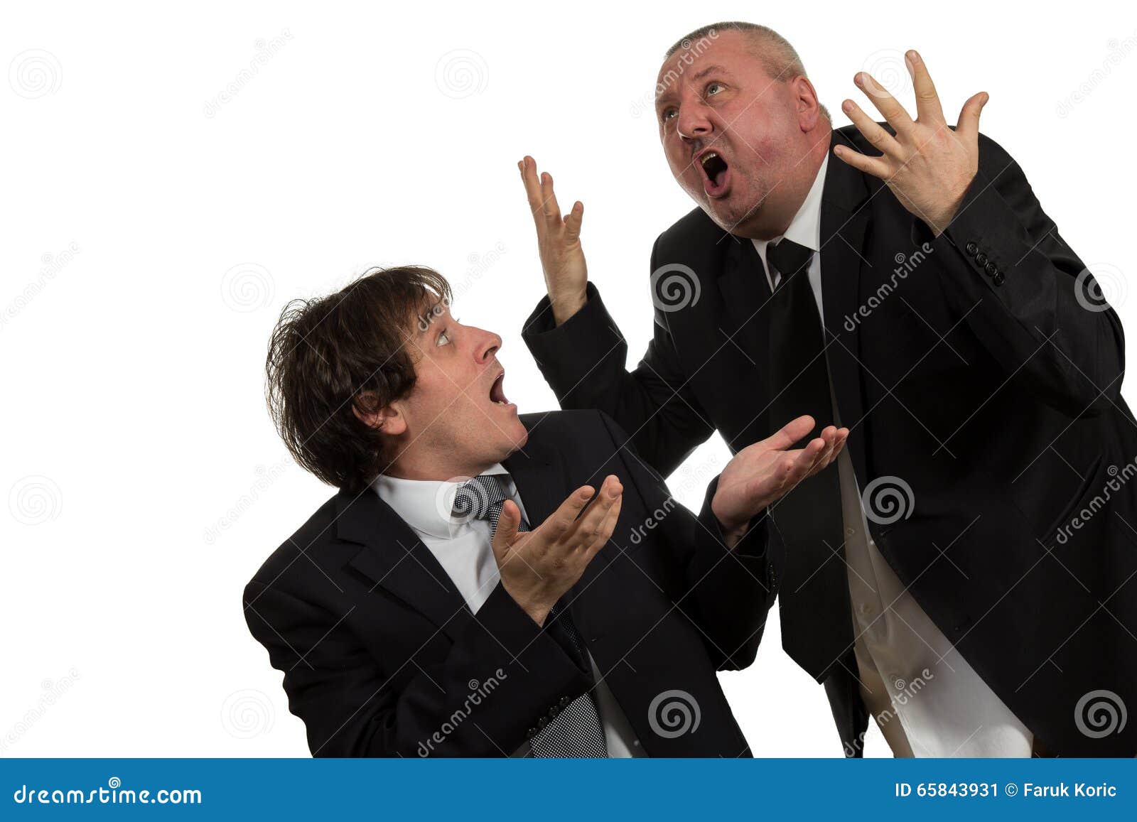 Businessman Screaming and Fighting at a Young Colleague Stock Image ...